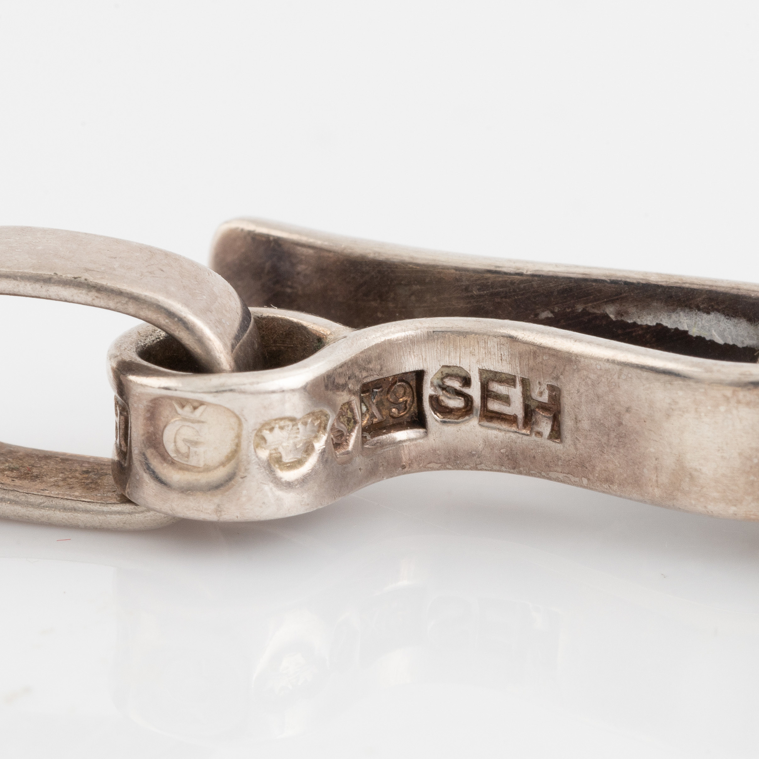 Sven-Erik Högberg, armband samt collier, silver. - Bukowskis