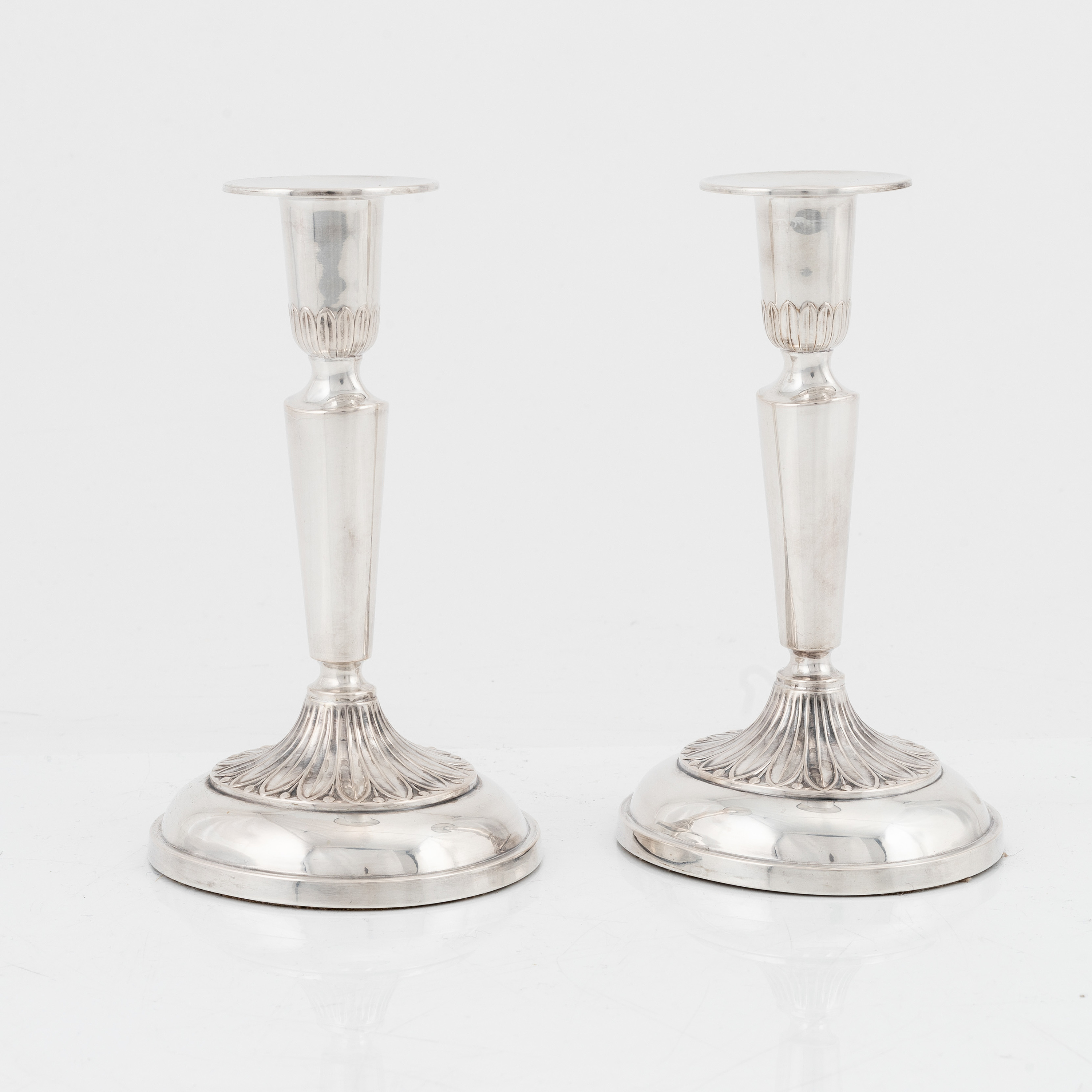 A pair of Swedish silver candlesticks, K & EC, Gothenburg, 1957 ...