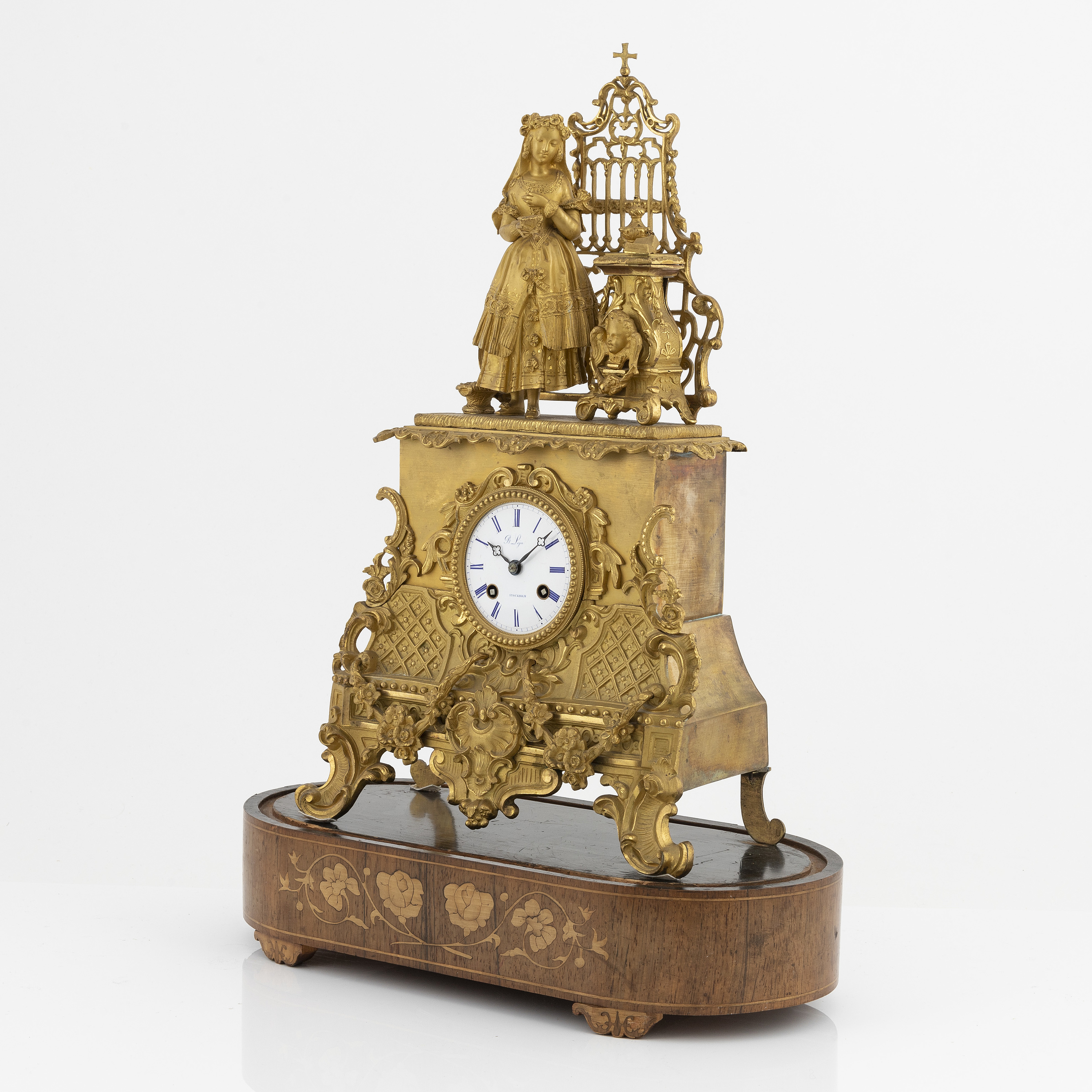 A rococo style mantle clock by Benjamin Leja, second half of the 19th ...