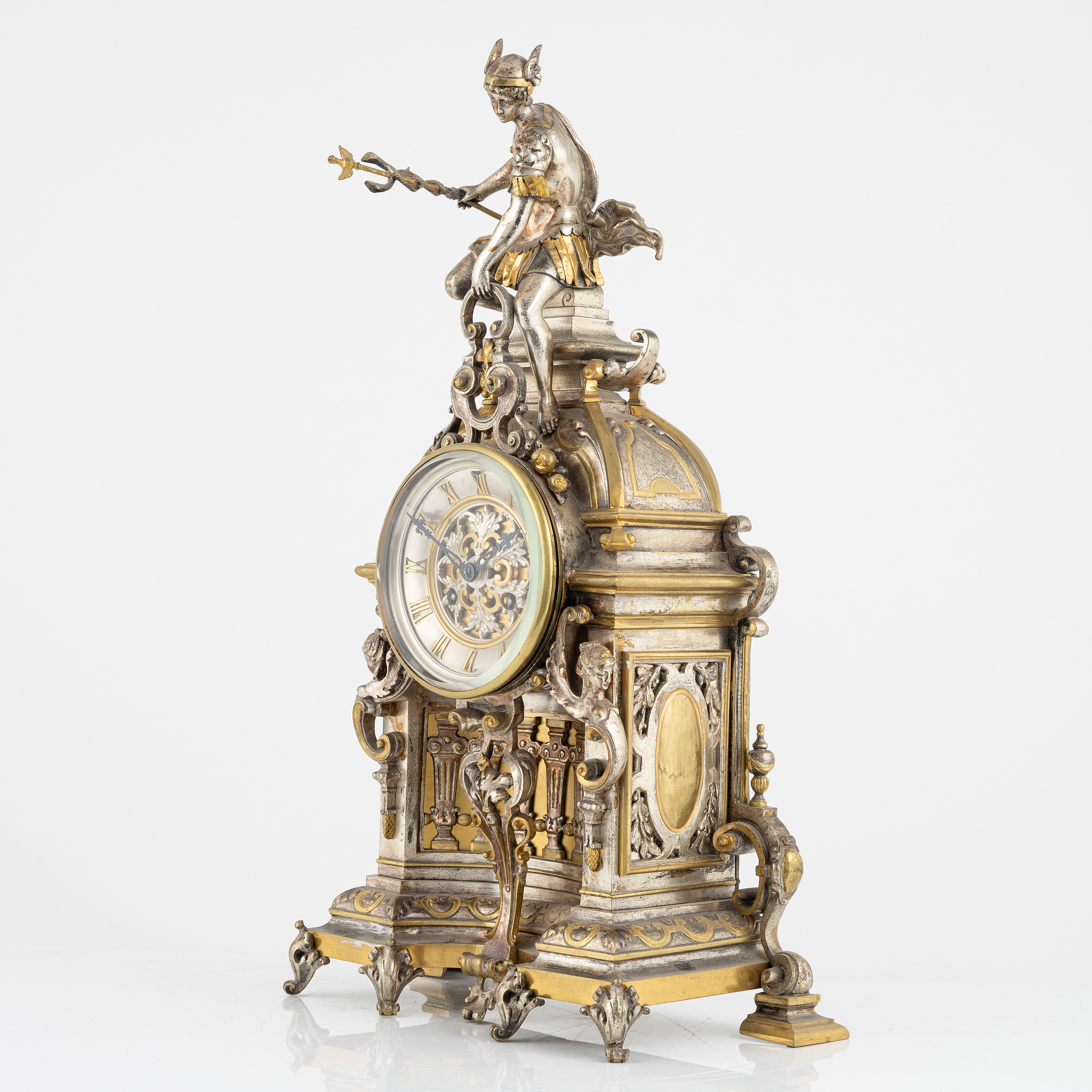 A Baroque style mantle clock, around 1900. - Bukowskis