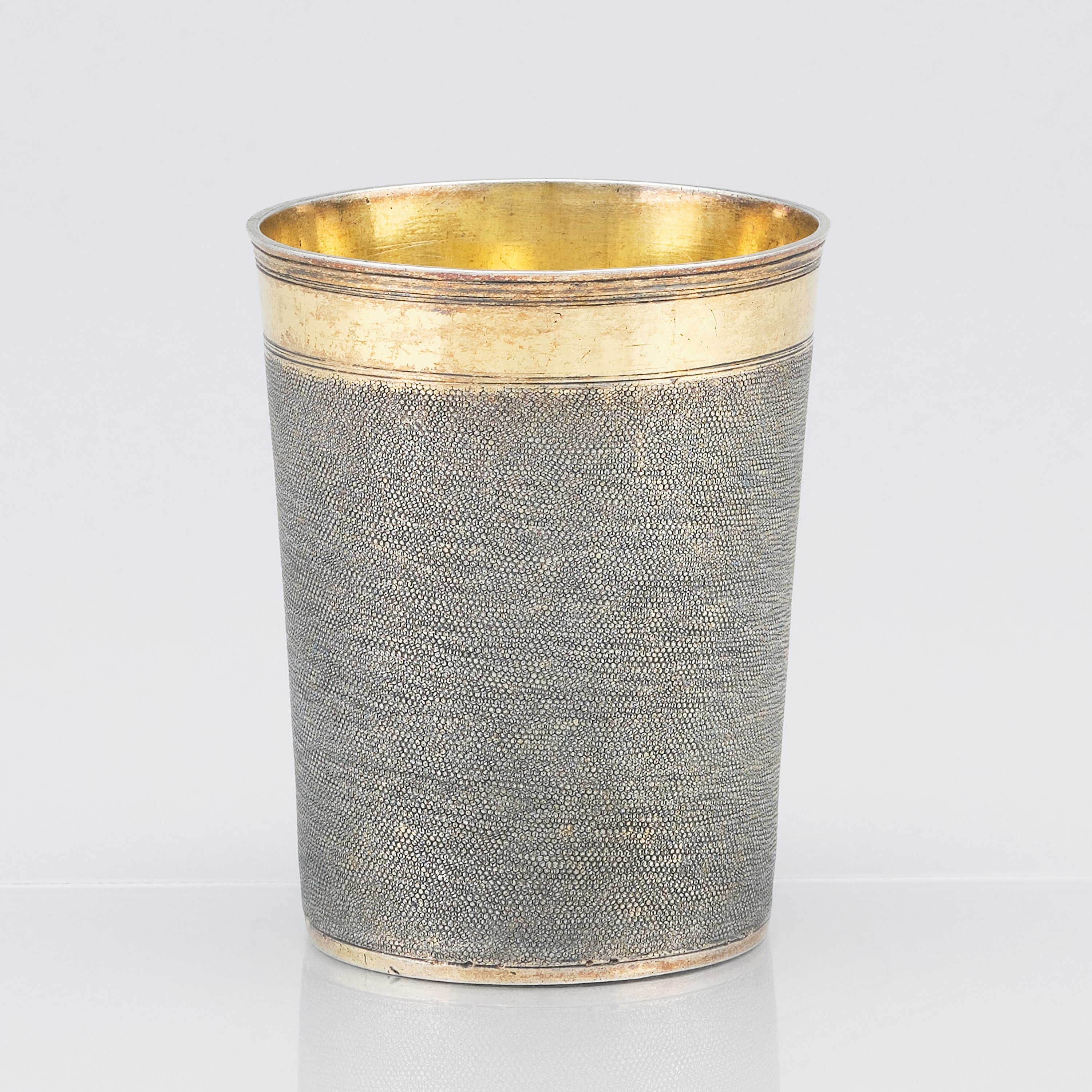 A German 17th Century parcel-gilt silver beaker, mark of Marx ...