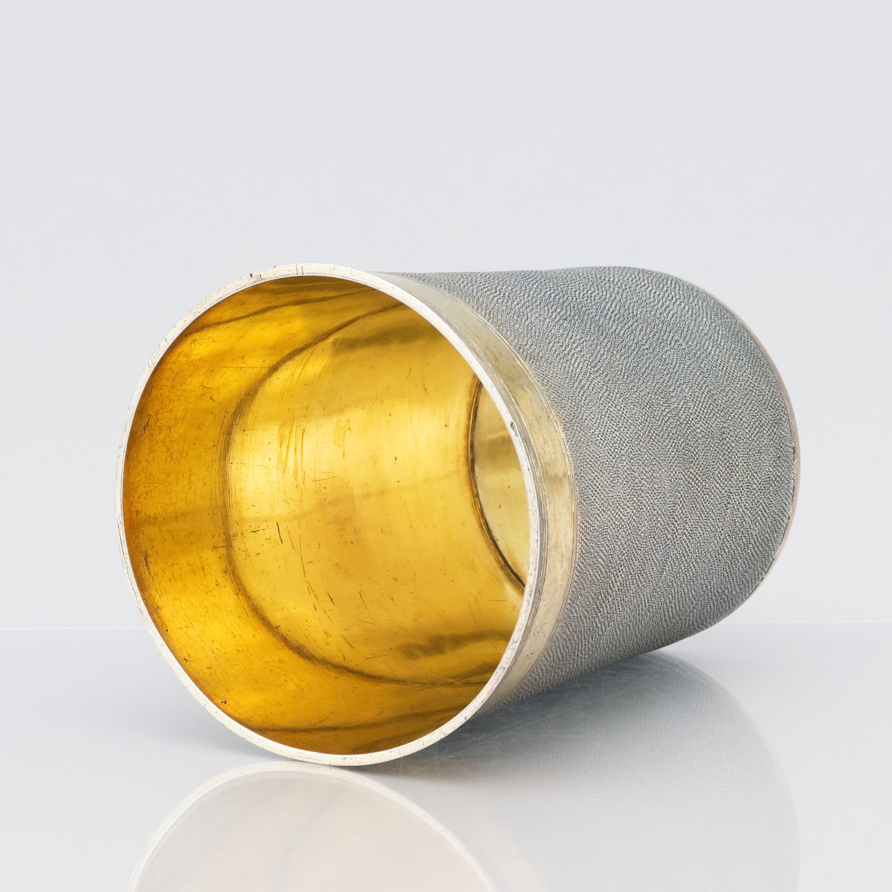 A German 17th Century parcel-gilt silver beaker, mark of Marx ...