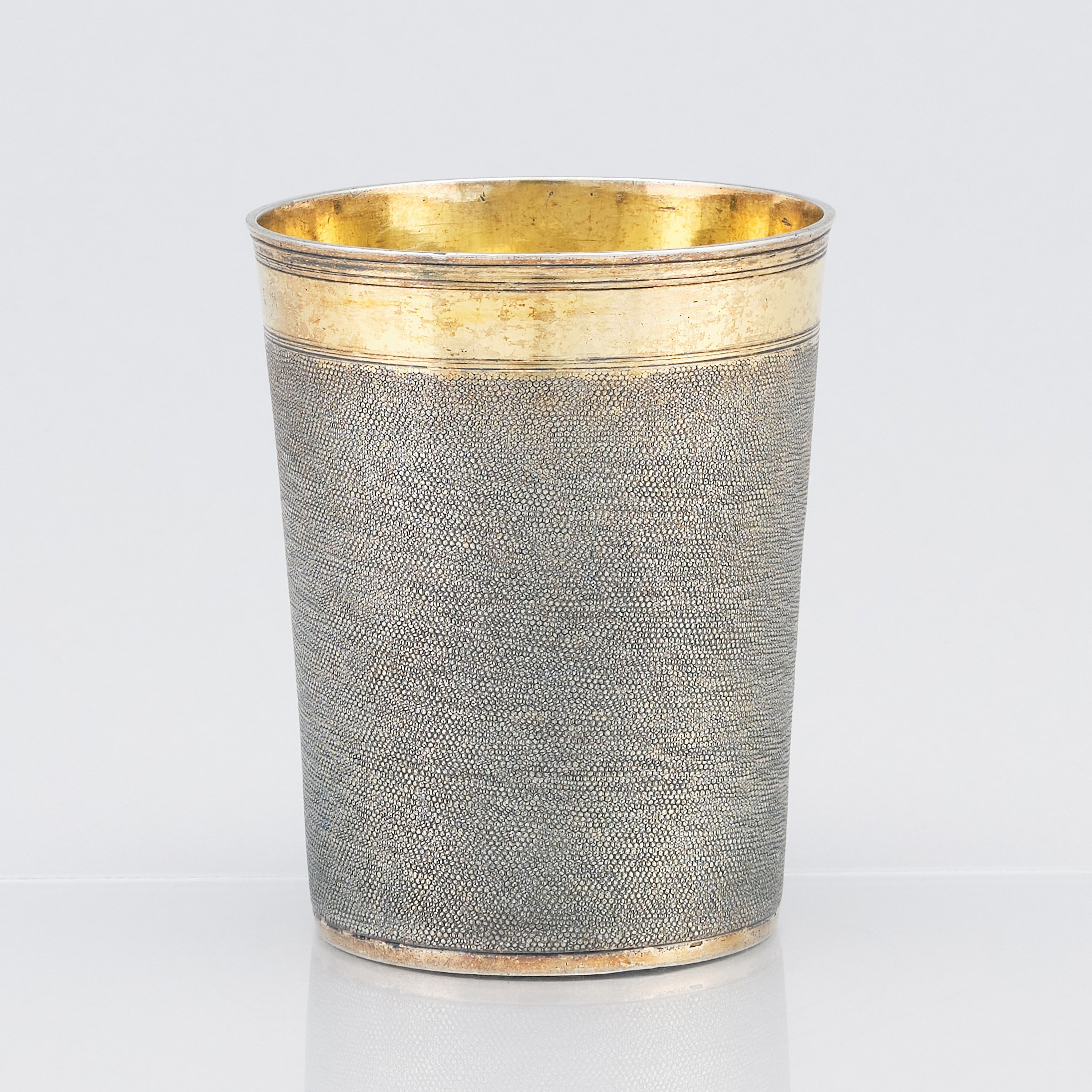 A German 17th Century parcel-gilt silver beaker, mark of Marx ...