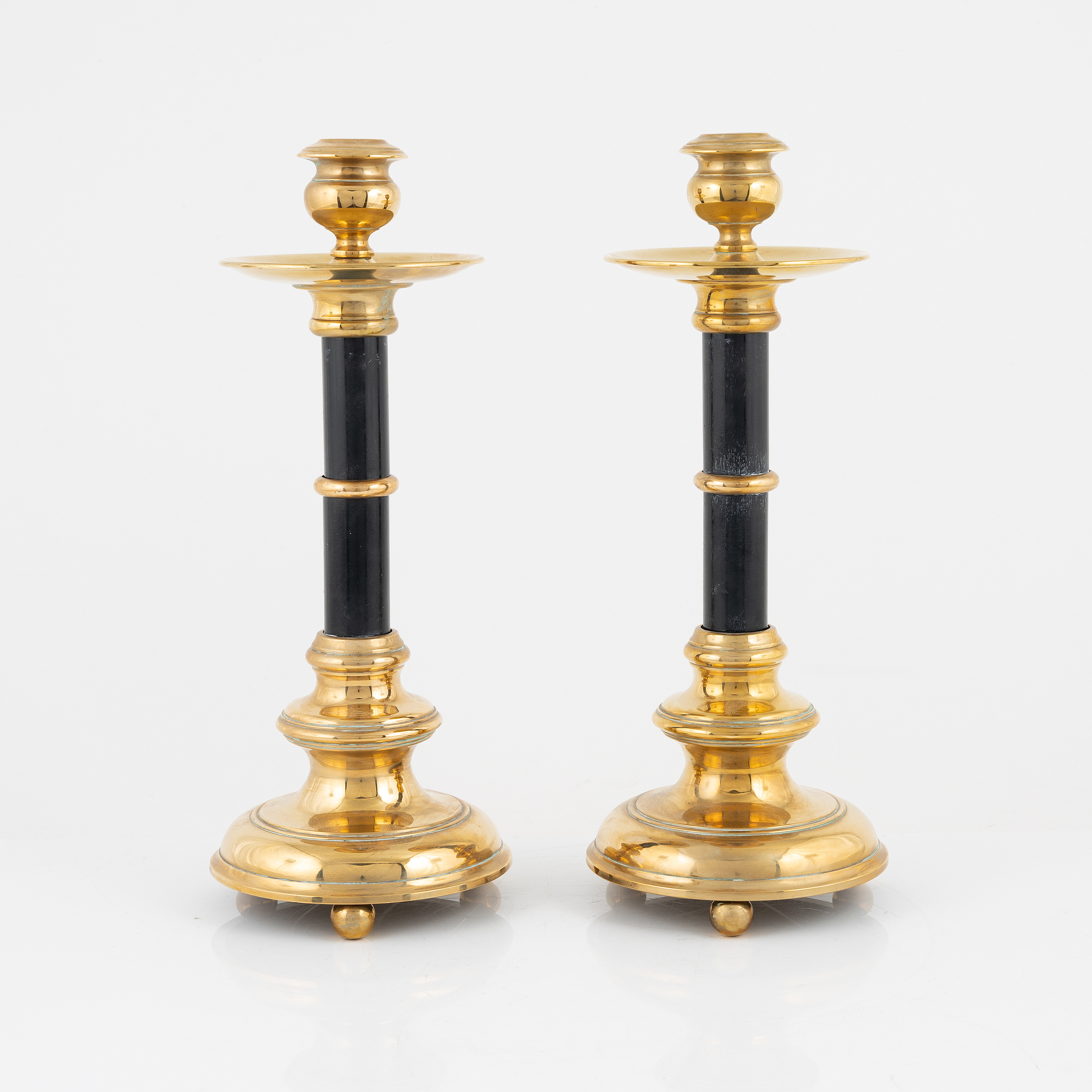 A pair of 'No 61' brass candlesticks, Skultuna, around the year 1900 ...
