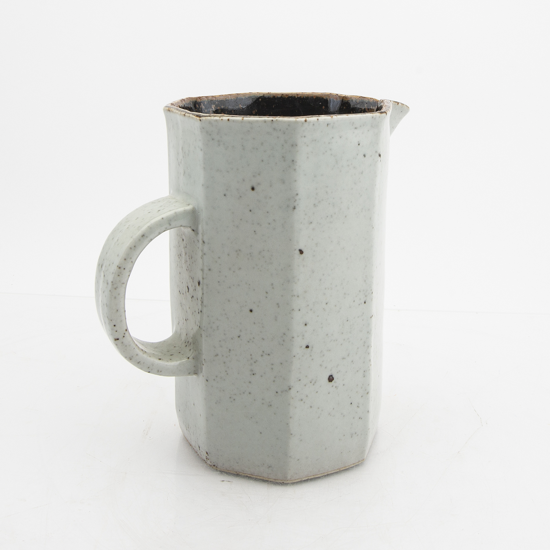 Signe Persson-Melin, a glazed ceramic pitcher, signed by hand numbered ...