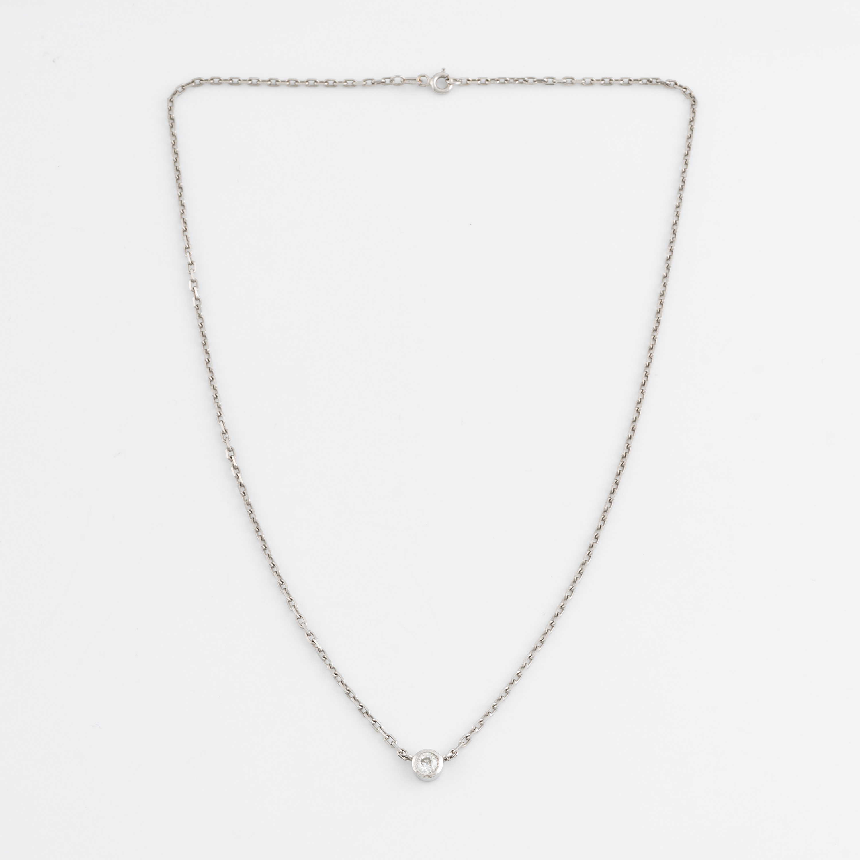 Collier, 18K vitguld med gammalslipad diamant, ca 0,40 ct. - Bukowskis