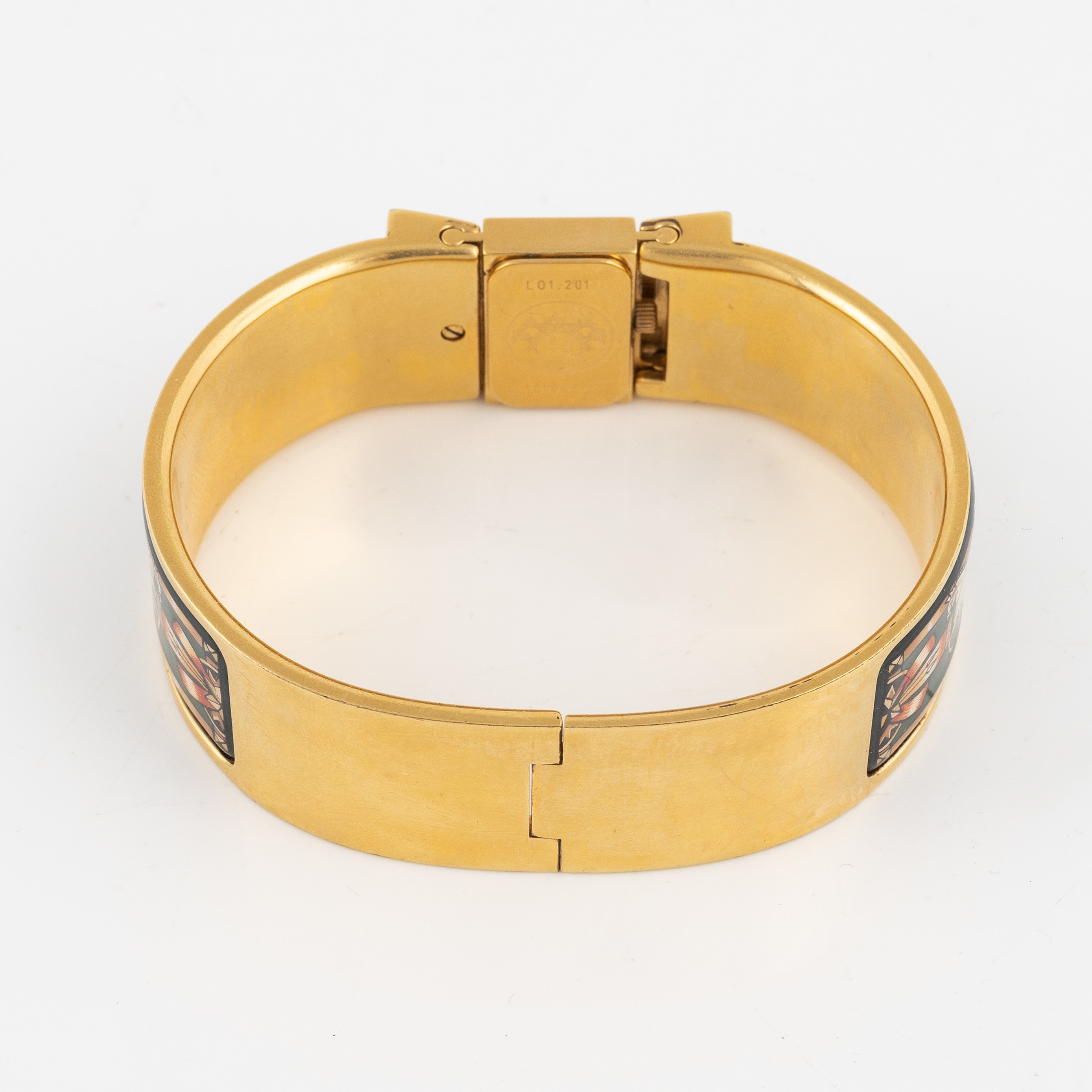 Hermès, A enamel and gold hardware 'Loquet watch'. - Bukowskis