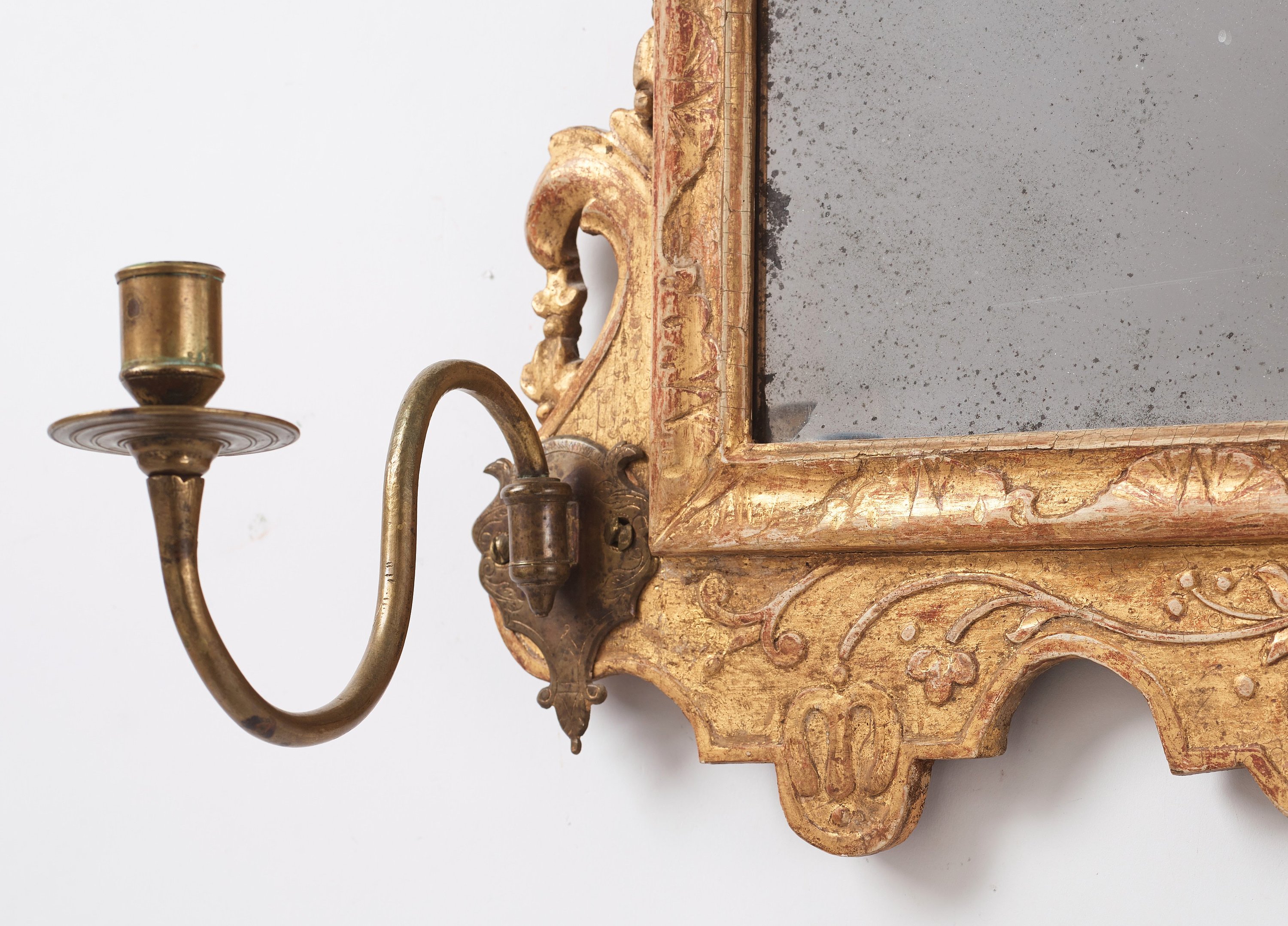 A Northern-European late Baroque two-light giltwood mirror sconce ...