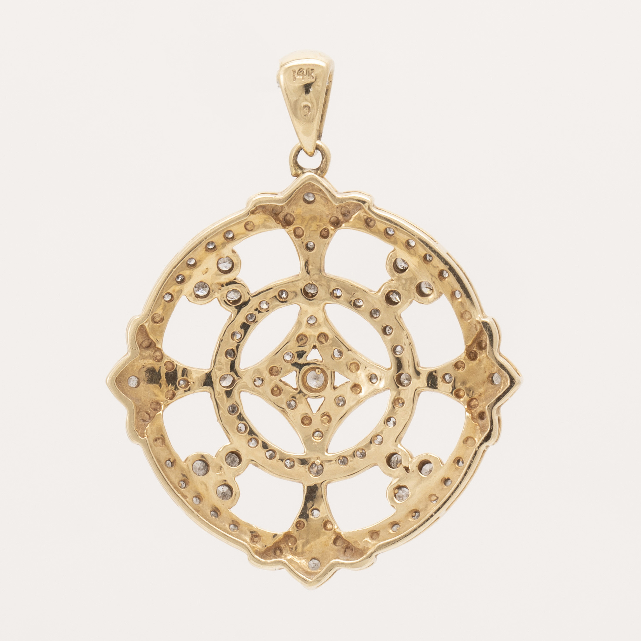 A 14K white and red gold penadant set with round brilliant and single ...