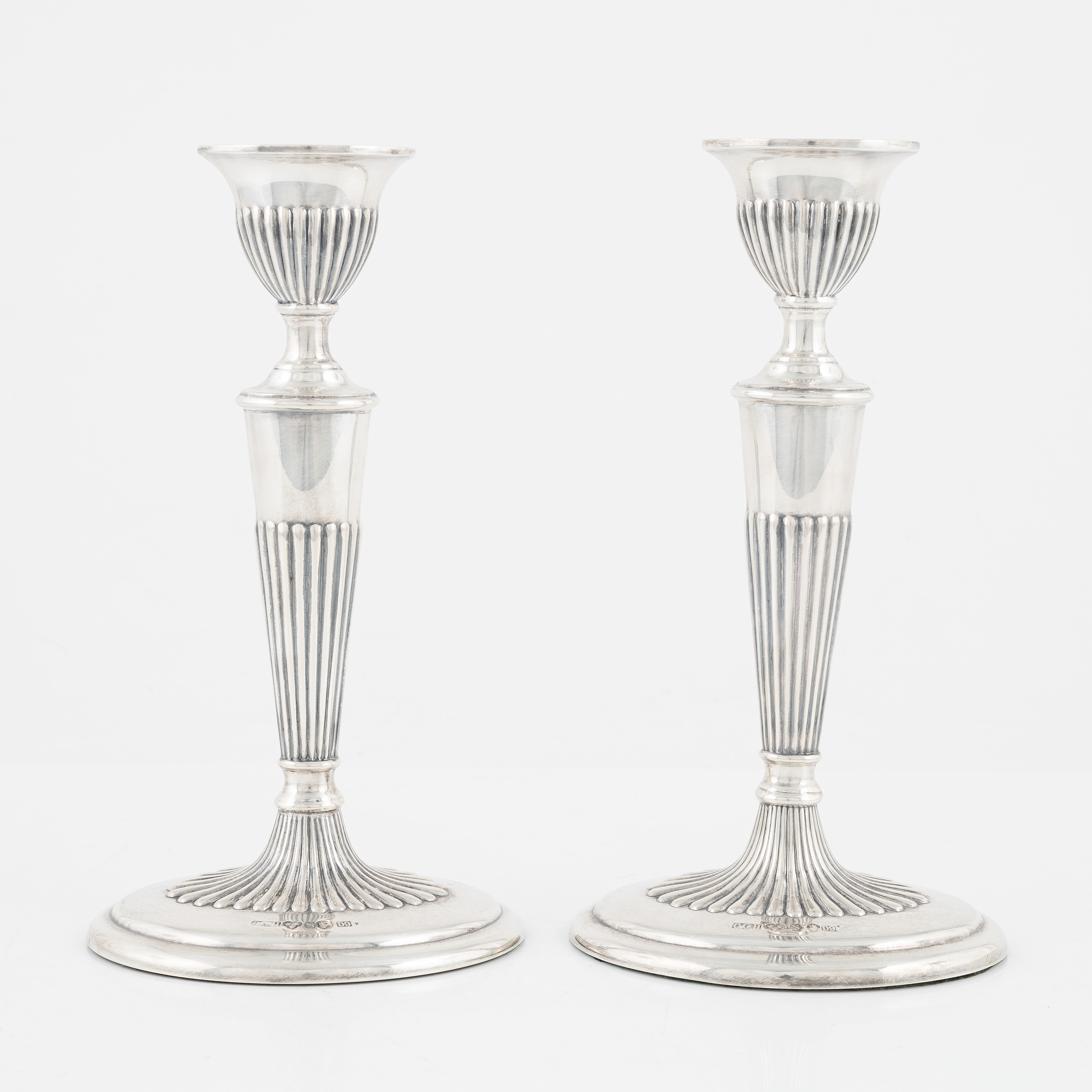 A pair of Swedish silver candlesticks, CG Hallberg, Stockholm, 1959 ...
