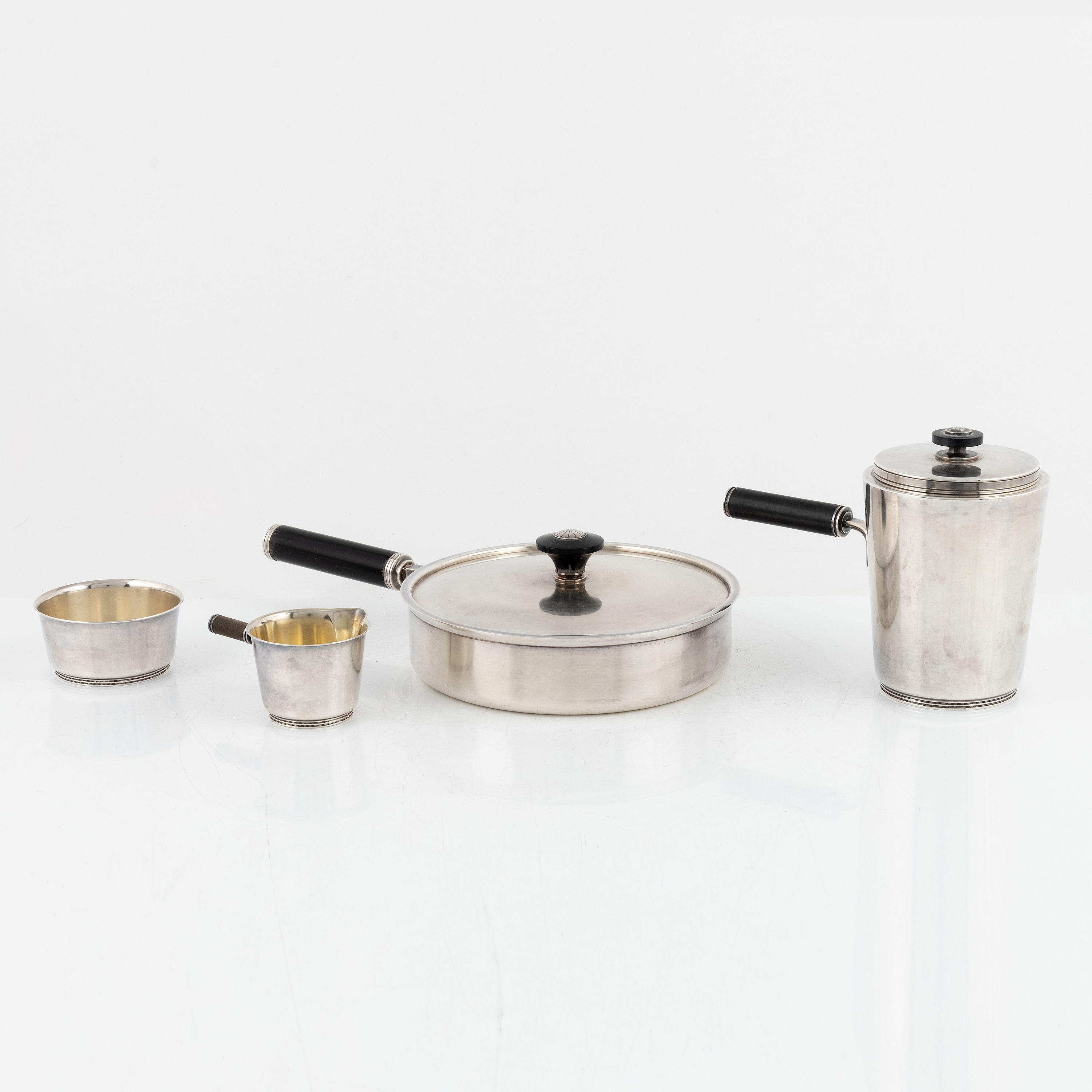 Erik Fleming, a 3-piece silver plated coffee service and a lidded dish ...