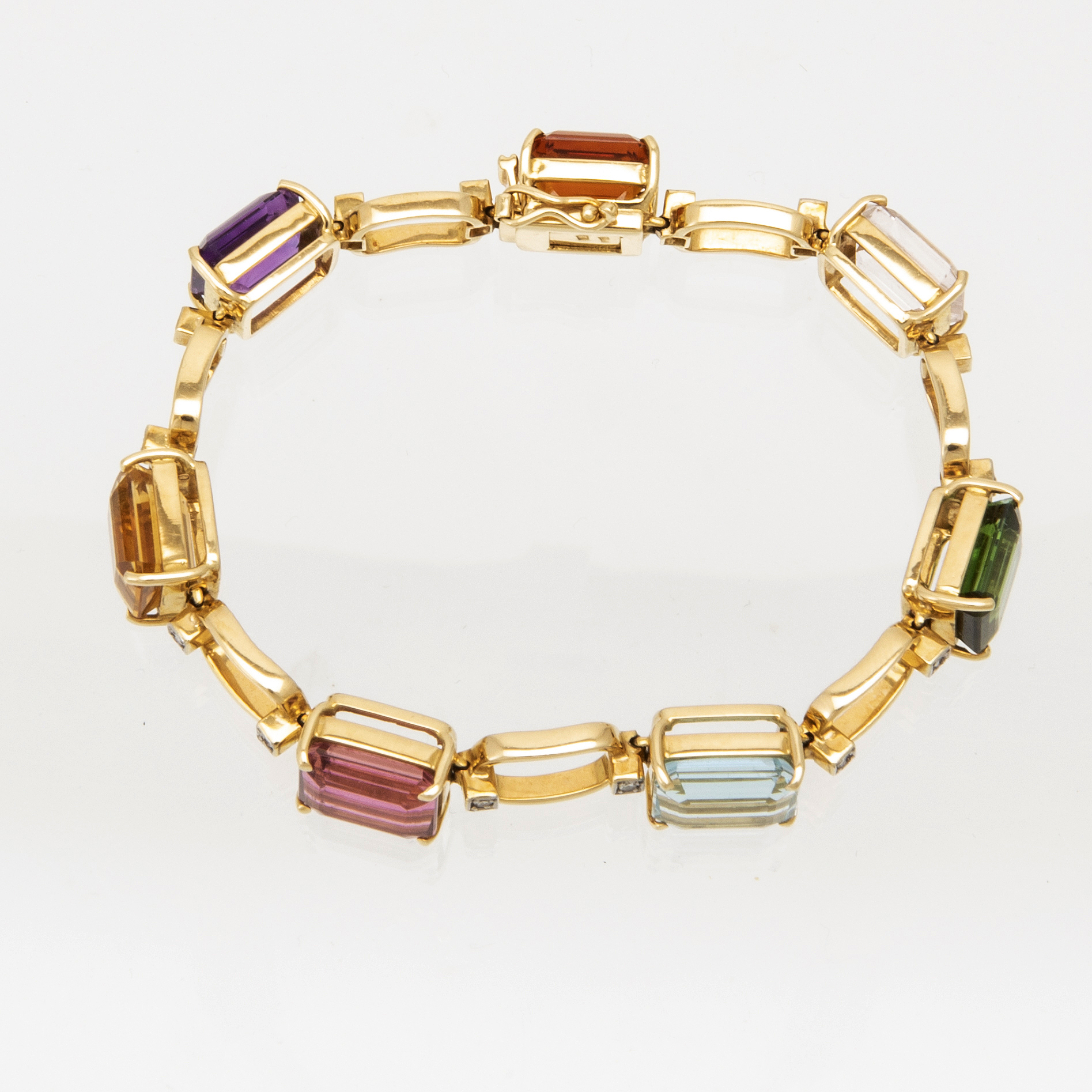 An 18K gold bracelet by H Stern set with round single cut diamonds and ...