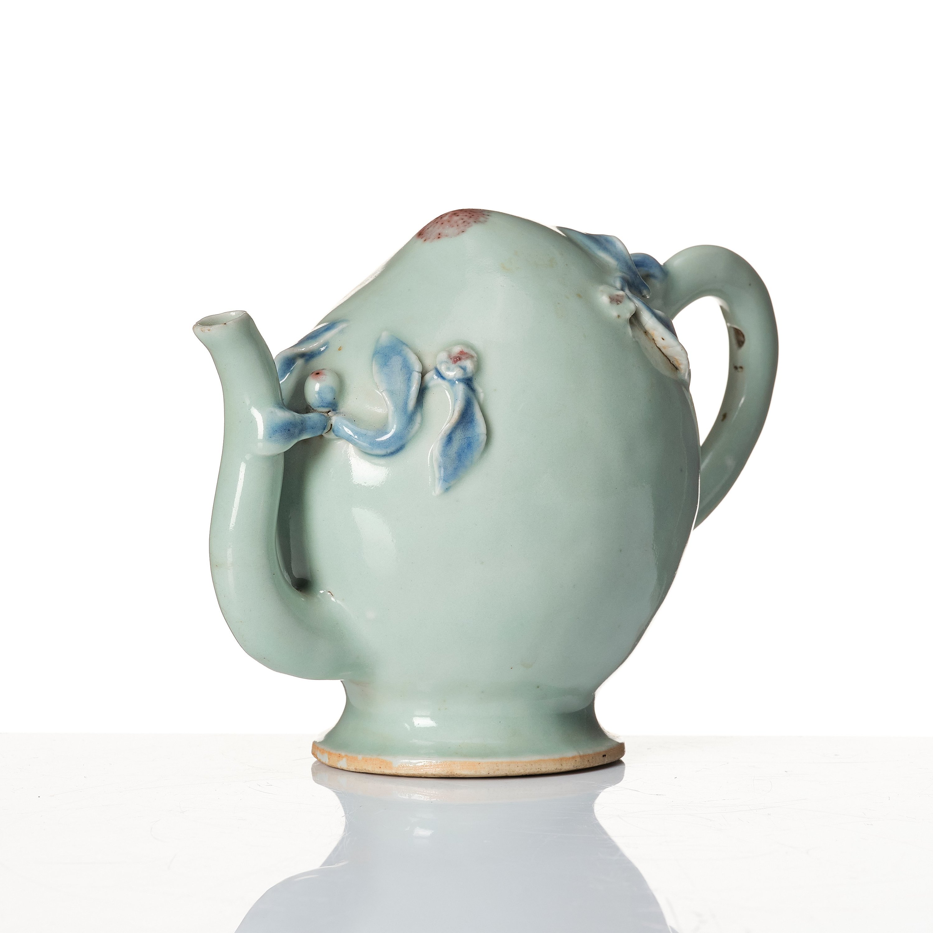 A celadon and underglaze blue and red glazed Cadogan tea pot, Qing ...