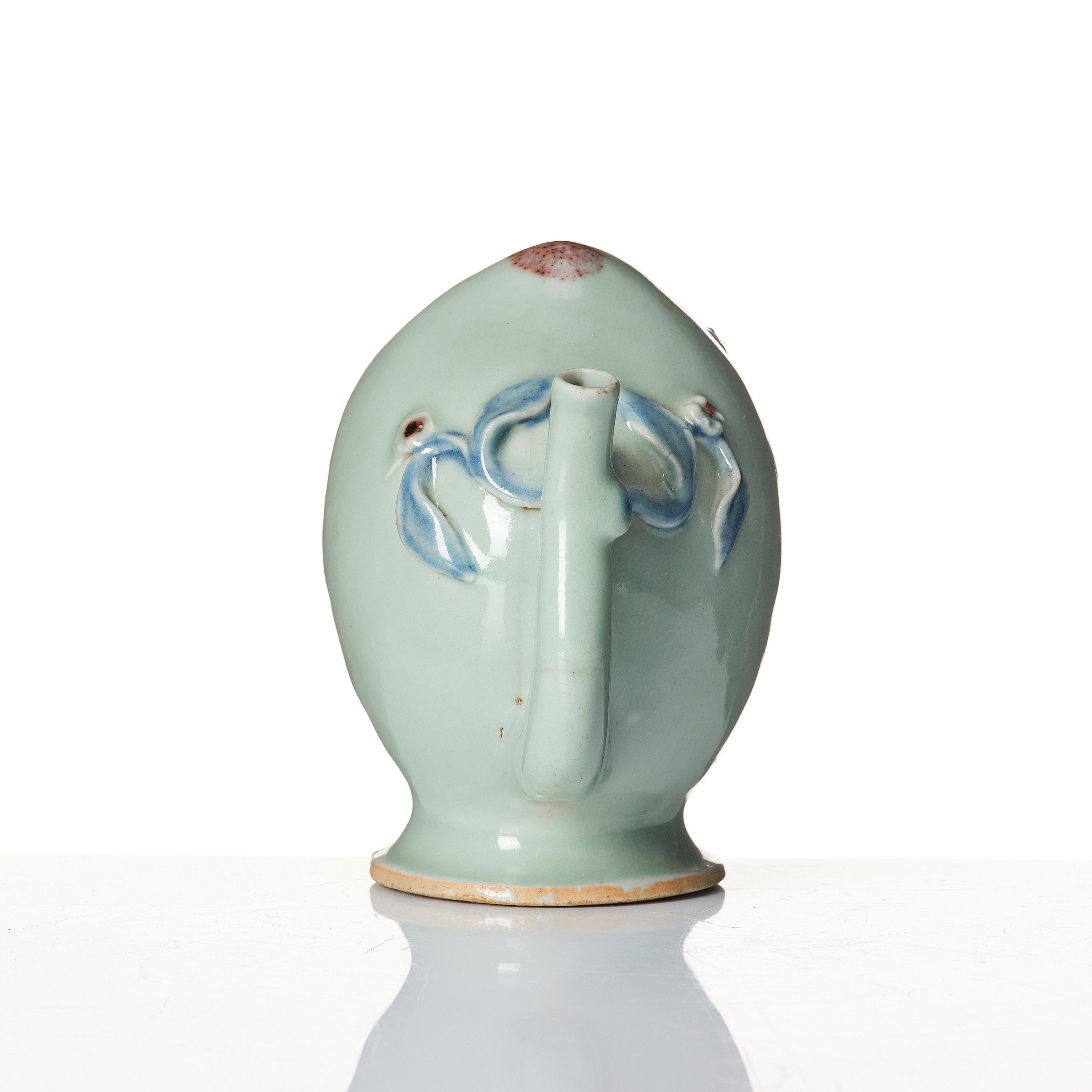A celadon and underglaze blue and red glazed Cadogan tea pot, Qing ...