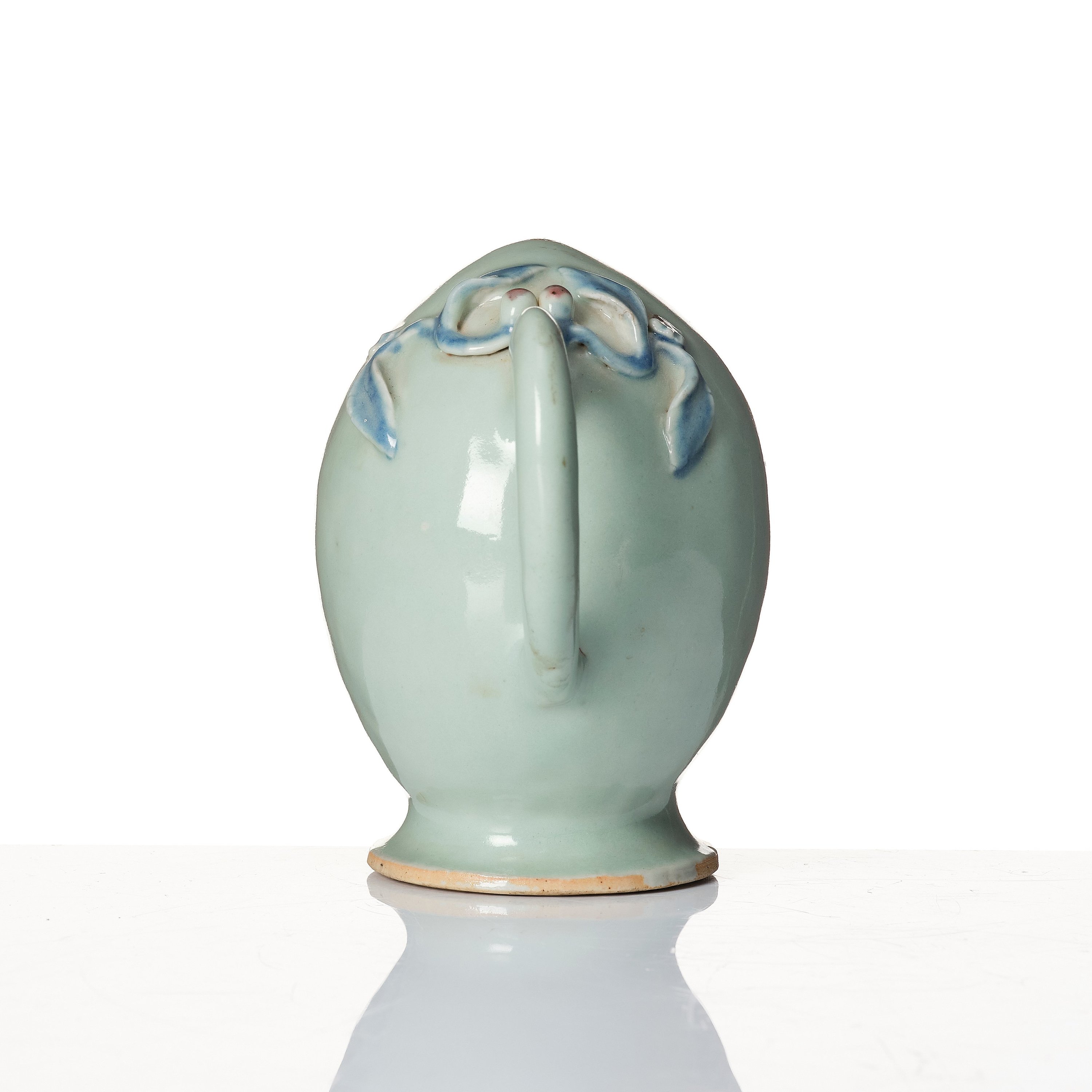 A celadon and underglaze blue and red glazed Cadogan tea pot, Qing ...