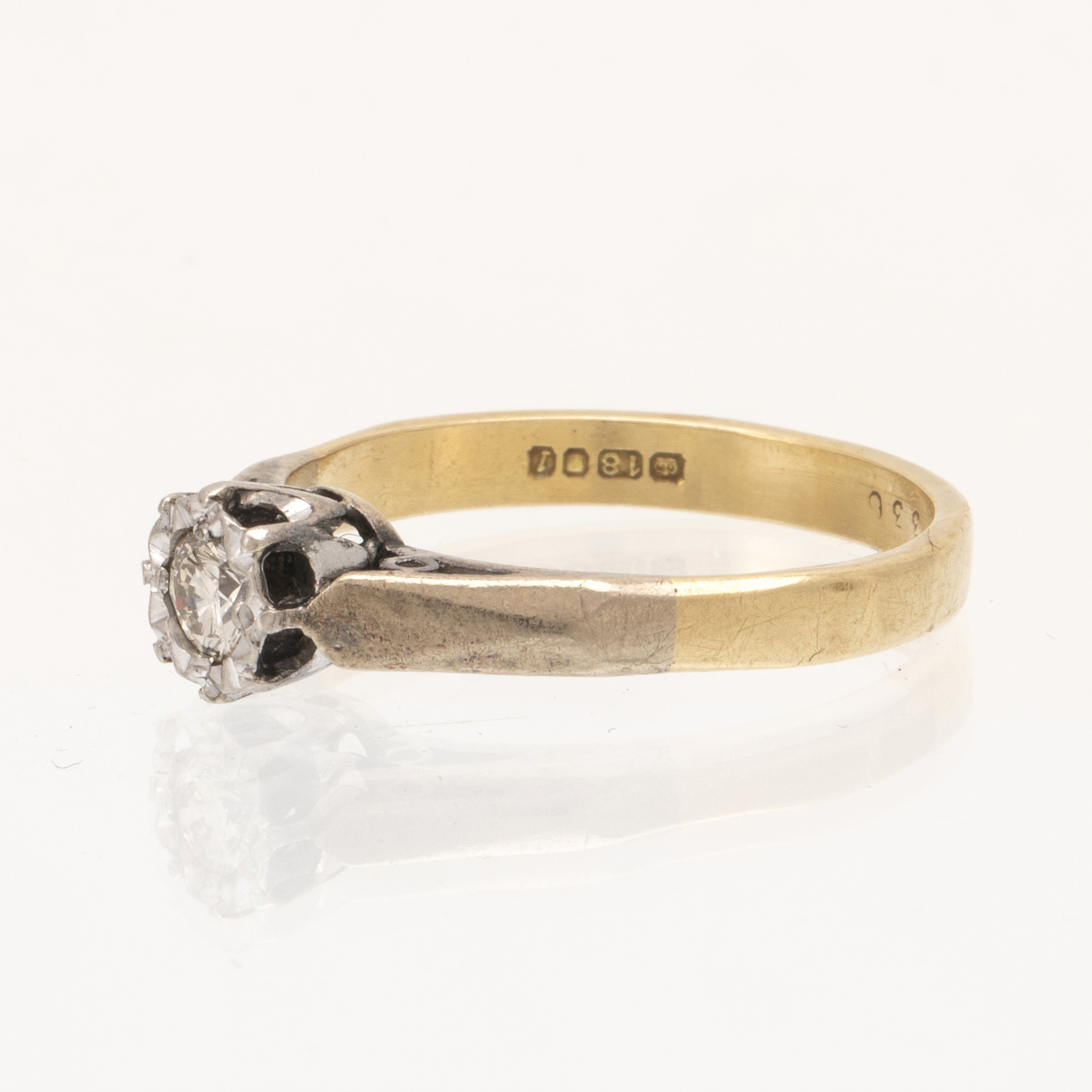 Ring 18K vitt och rött guld samt rund briljantslipad diamant. - Bukowskis