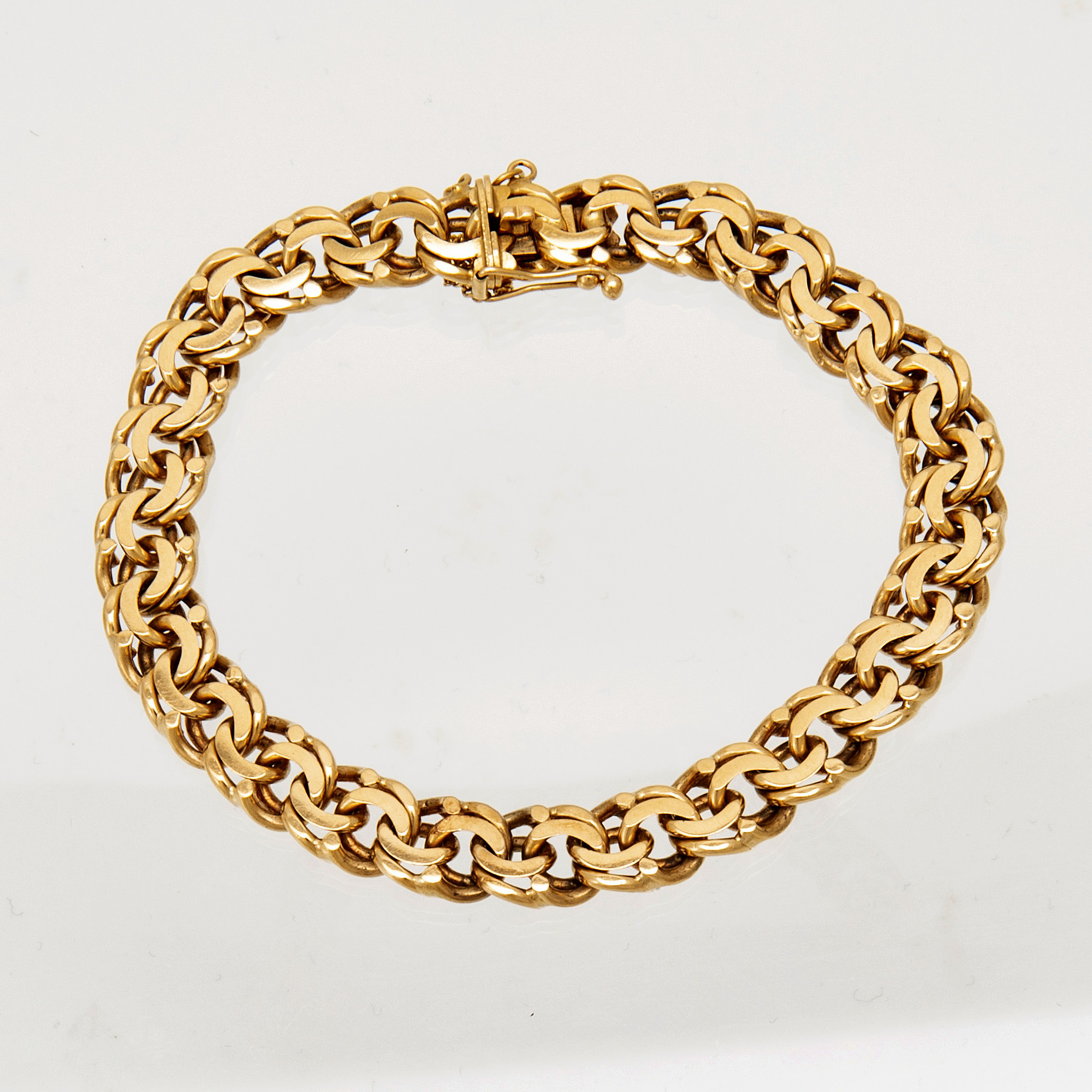 An 18K gold bracelet. - Bukowskis