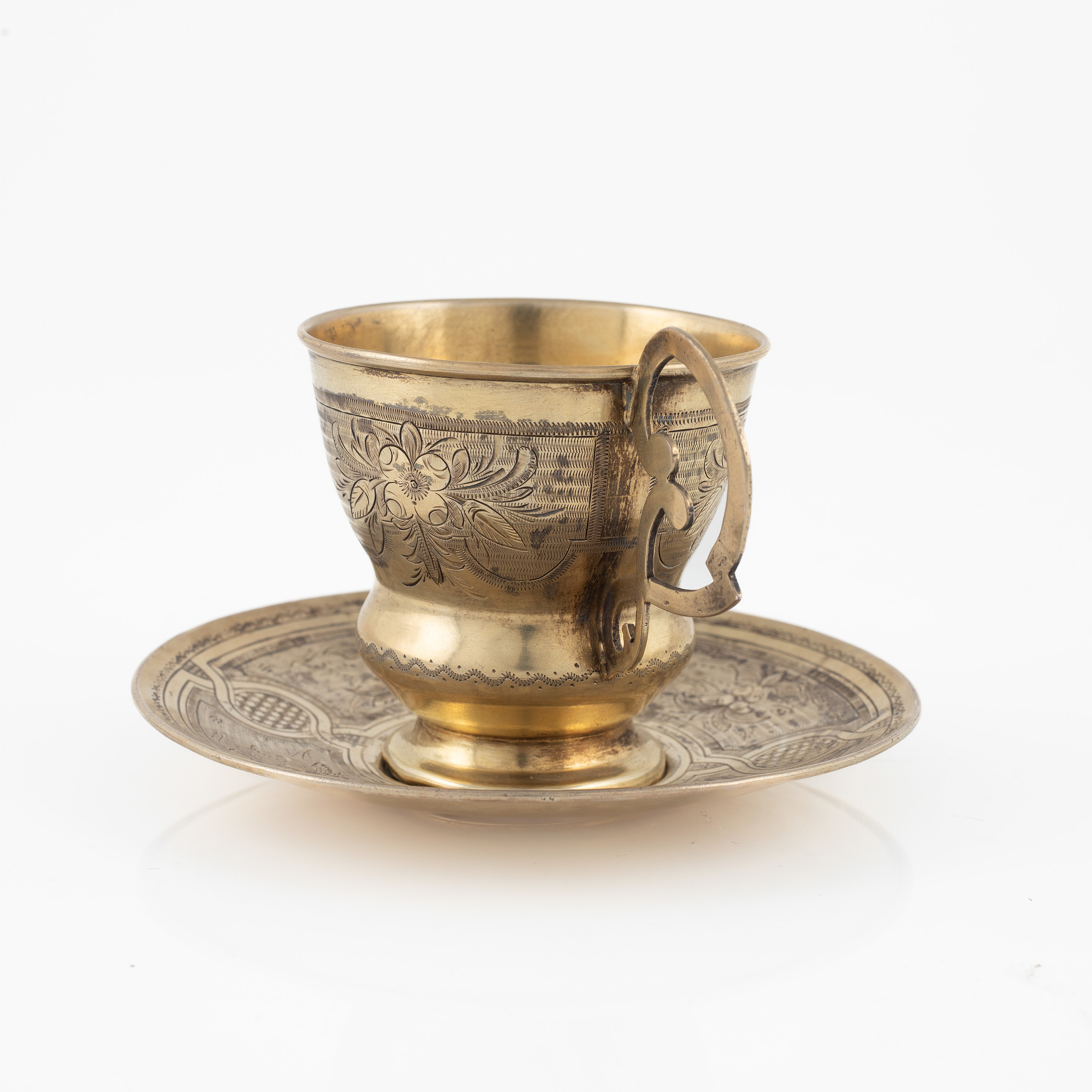 A Russian Silver Gilt Cup with Saucer, Moscow 1869. - Bukowskis