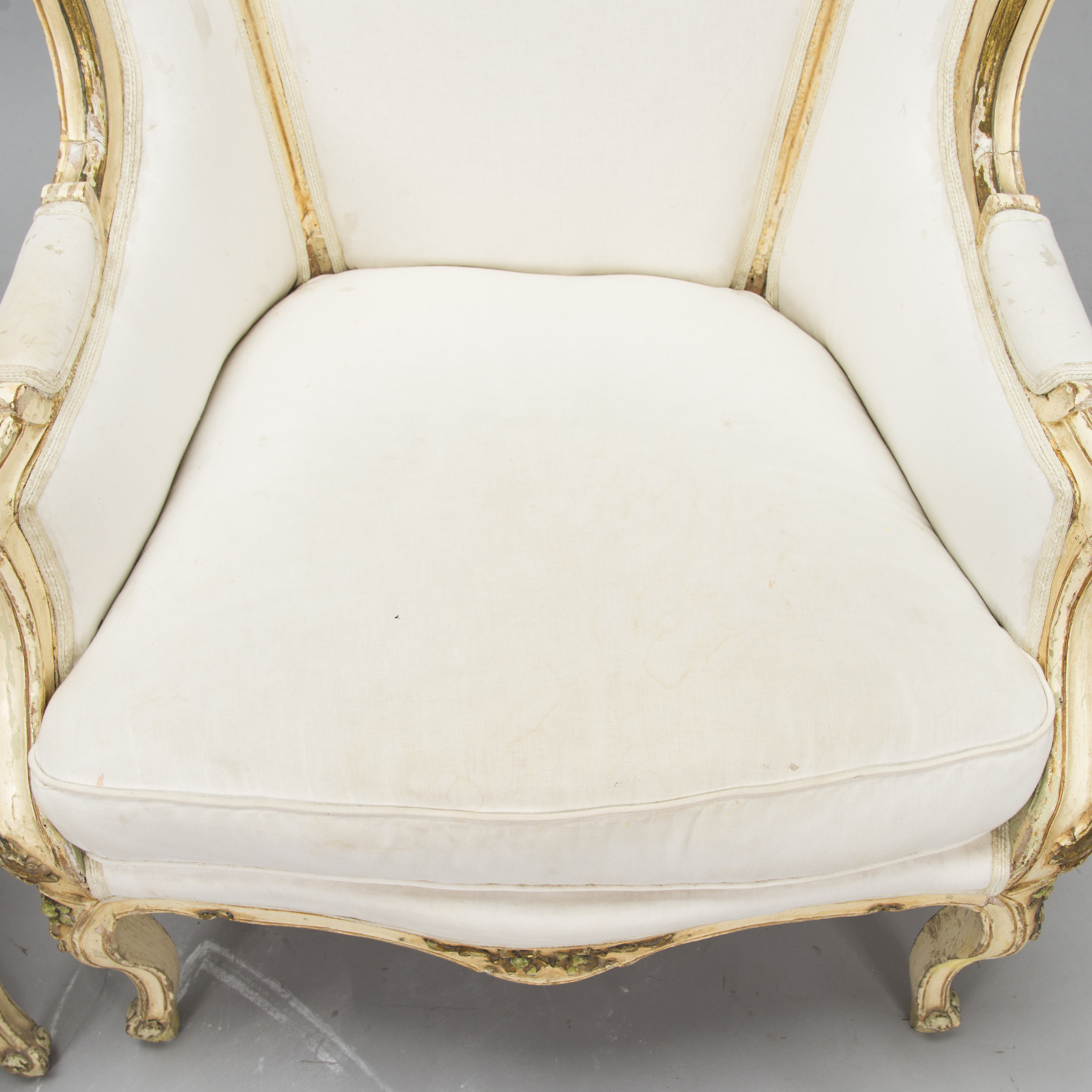 A pair of louis quinze style bergerer armchairs, first part of the 20th ...