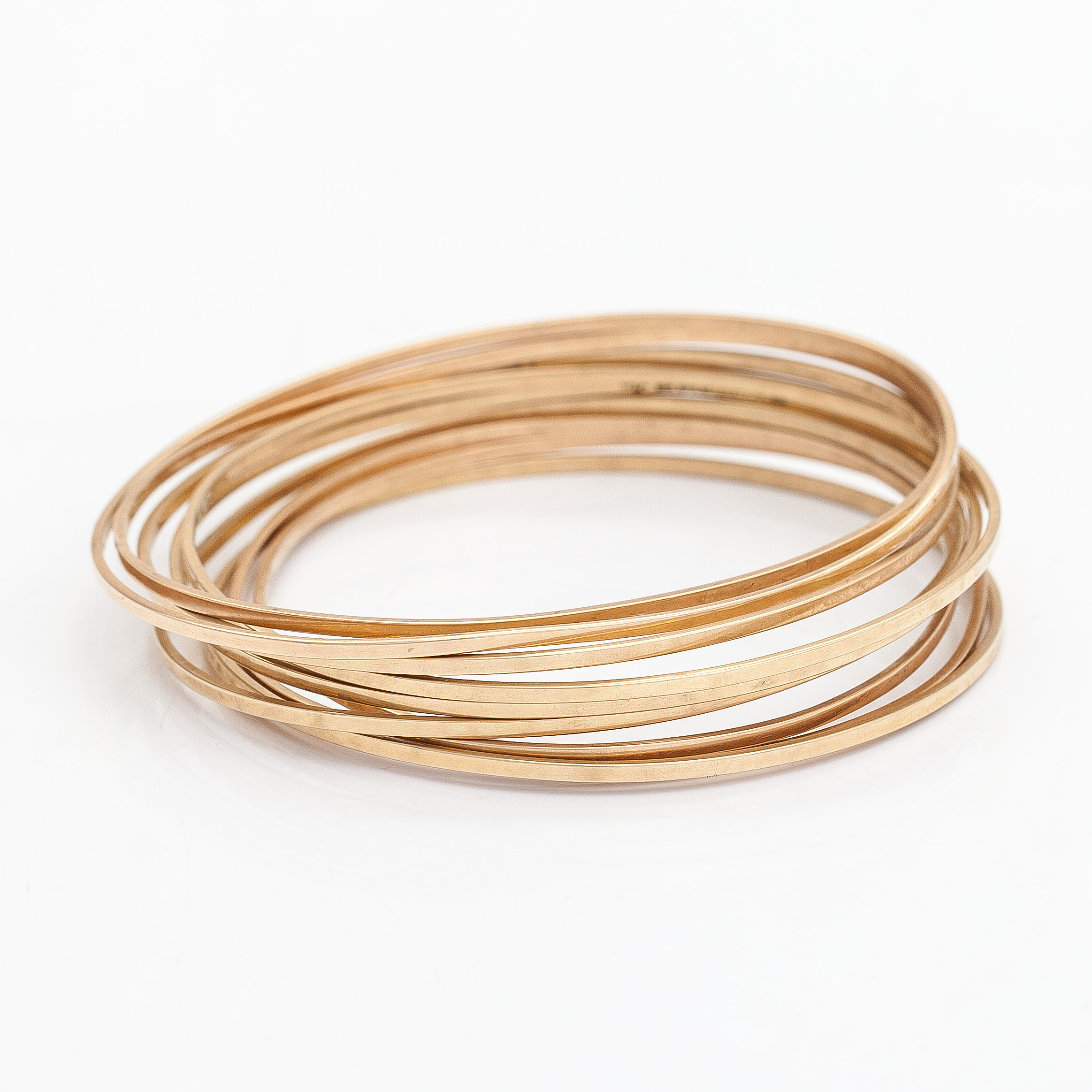 Bangles, 9 pieces, 14K gold, Maarianhamina, 1991 and 2000. - Bukowskis