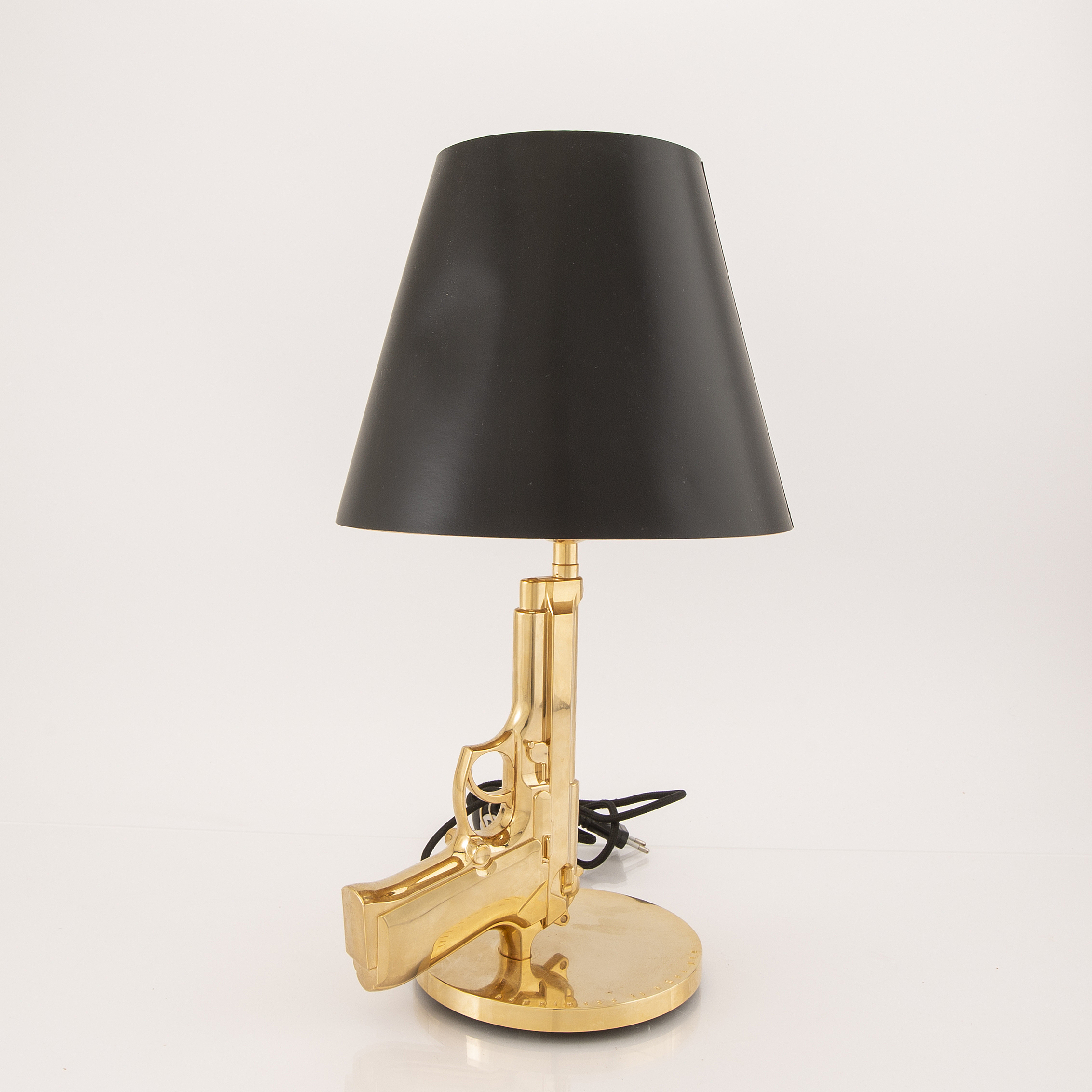 Philippe Starck, table lamp, "Gun bedside Lamp", Flos, Italy. - Bukowskis