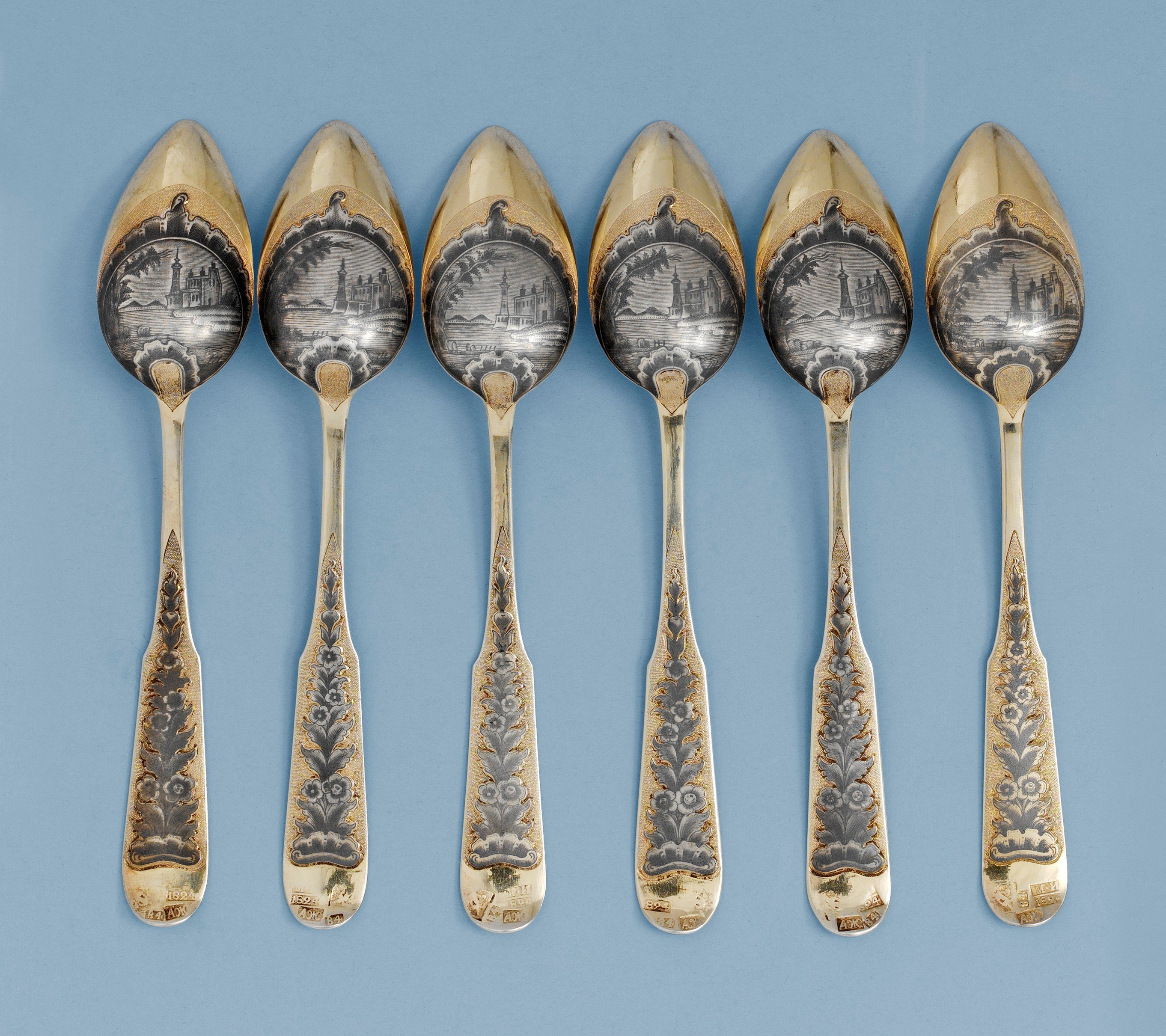 A SET OF SIX RUSSIAN SILVER-GILT AND NIELLO TEA-SPOONS, makers mark of ...