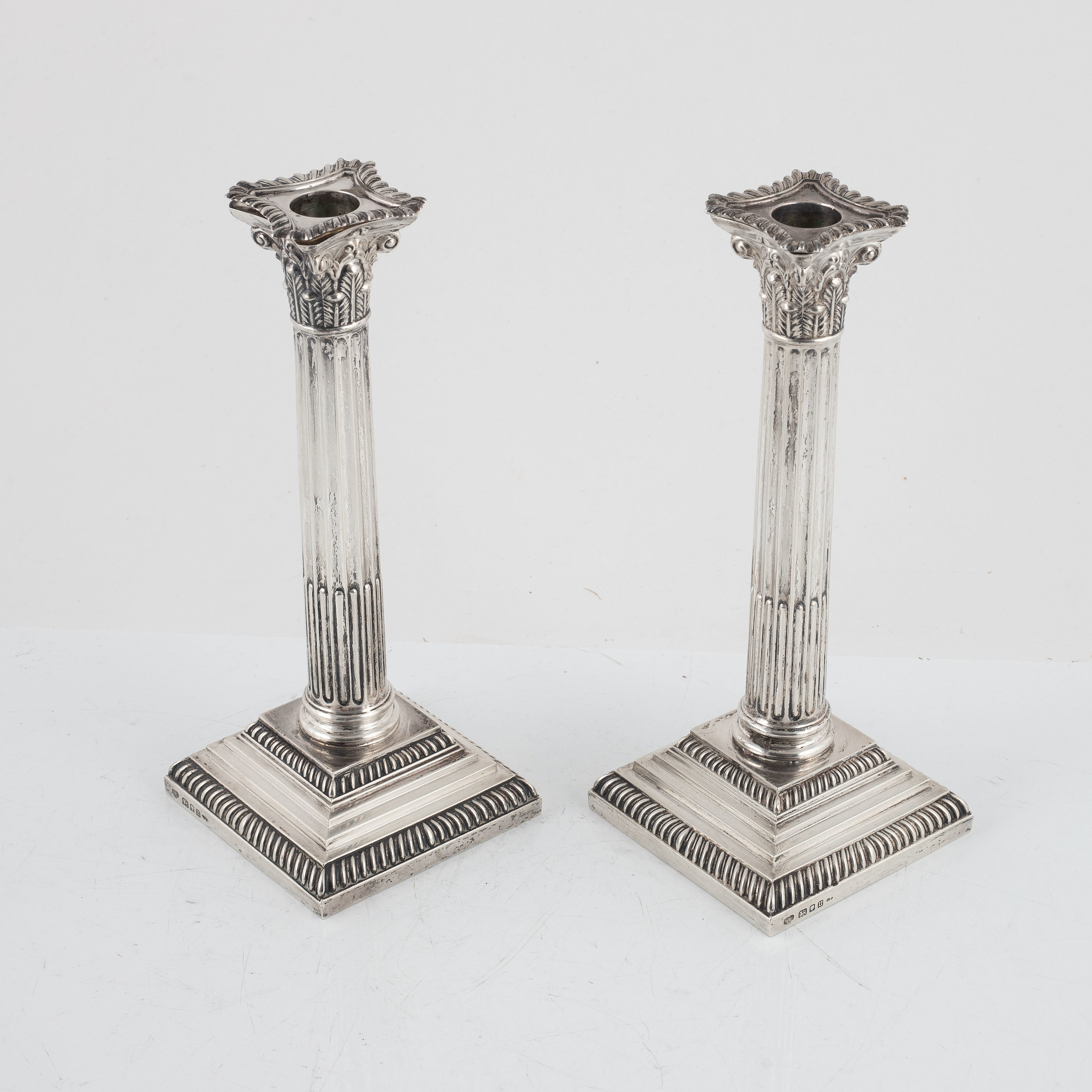 A pair of silver candlesticks, Goldsmiths & Silversmiths Co. Ltd ...