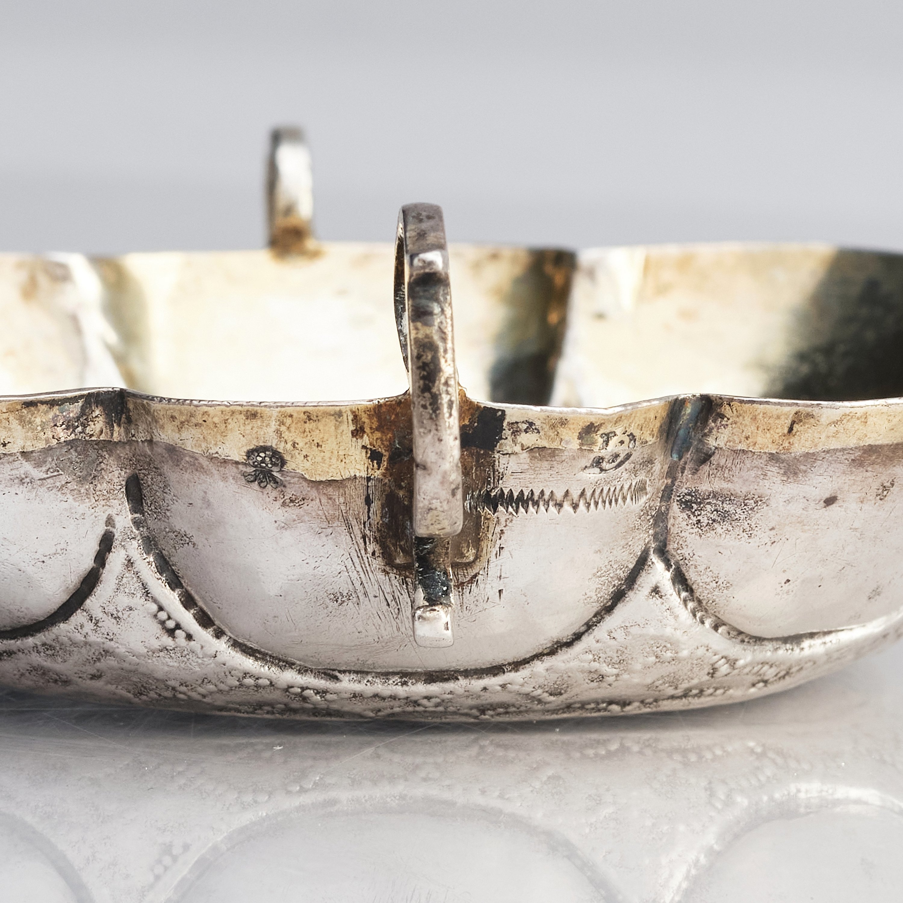 A small German parcel-gilt silver dish (possibly wine tasting bowl ...