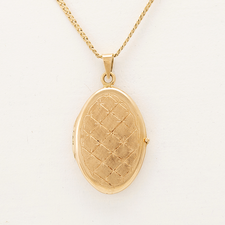 Halsband med berlock 18K guld. - Bukowskis