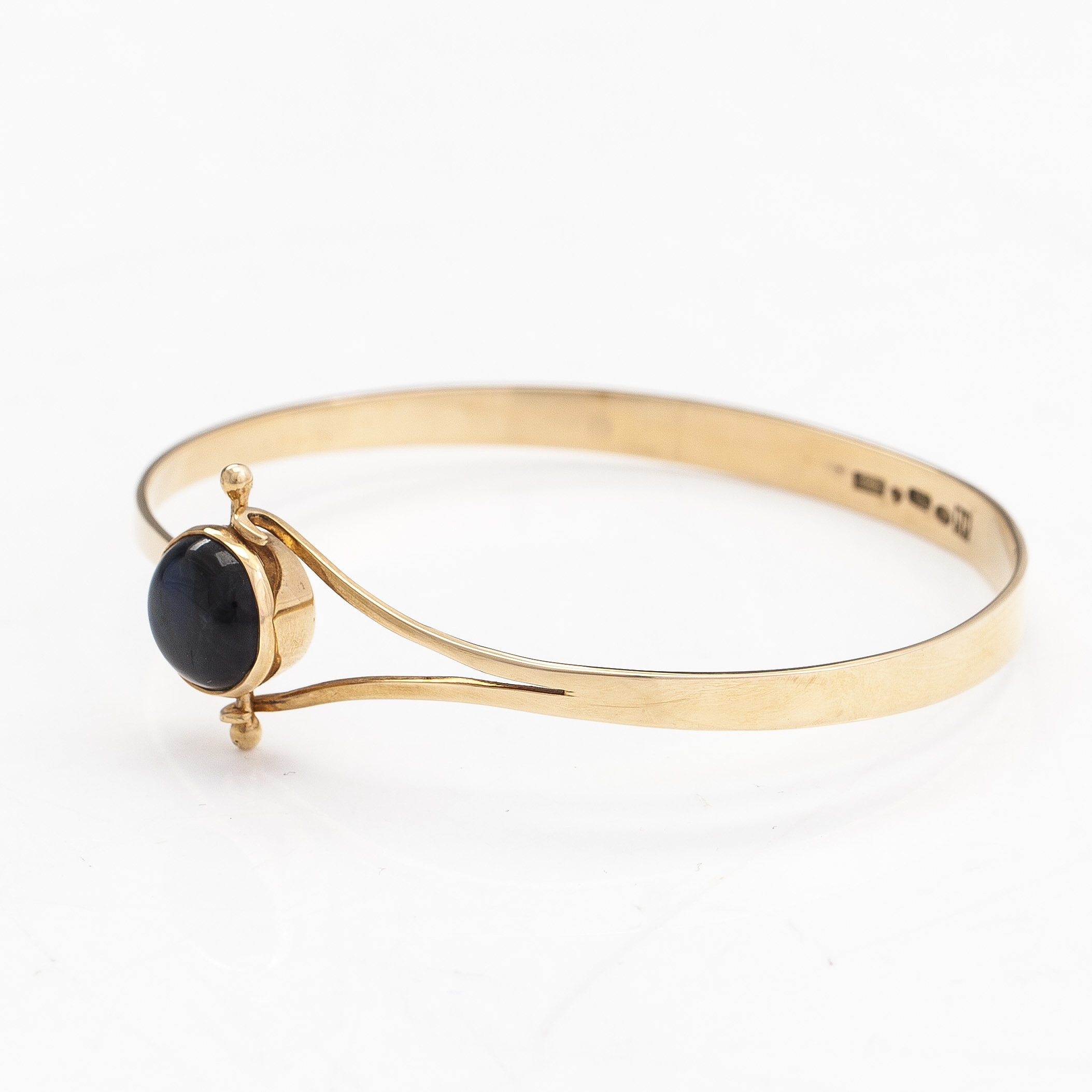 A 14K gold bracelet with a spectrolite for Kaunis Koru, Helsinki 1979 ...