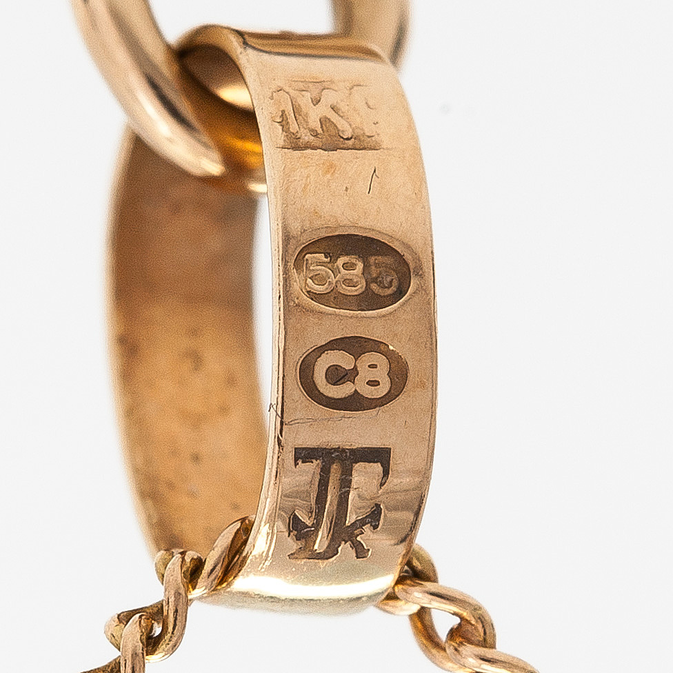 A 14K gold necklace with a spectrolite for Kaunis Koru, Helsinki 1980 ...