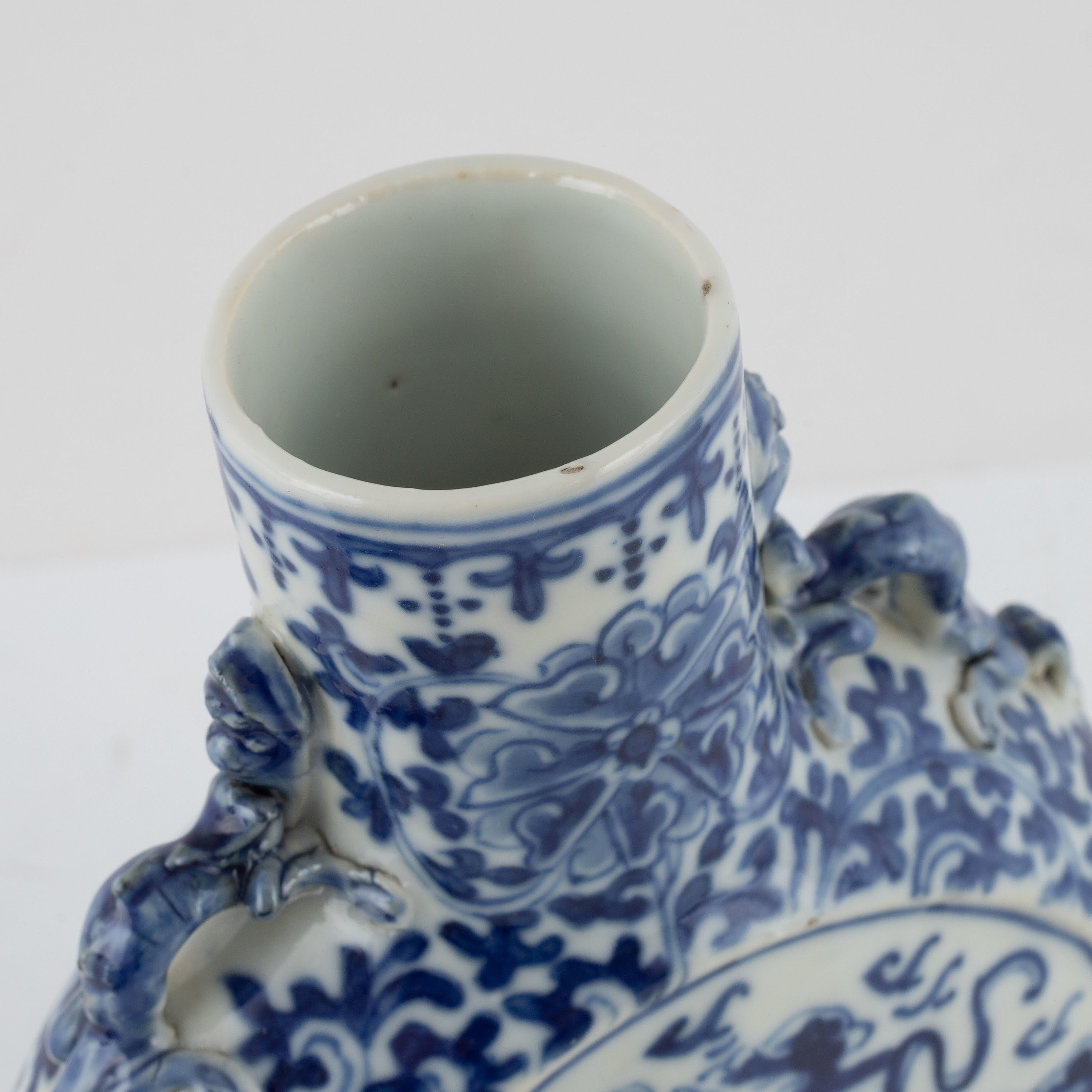 A blue and white porcelain moon flask, China, Qing Dynasty, 19th ...