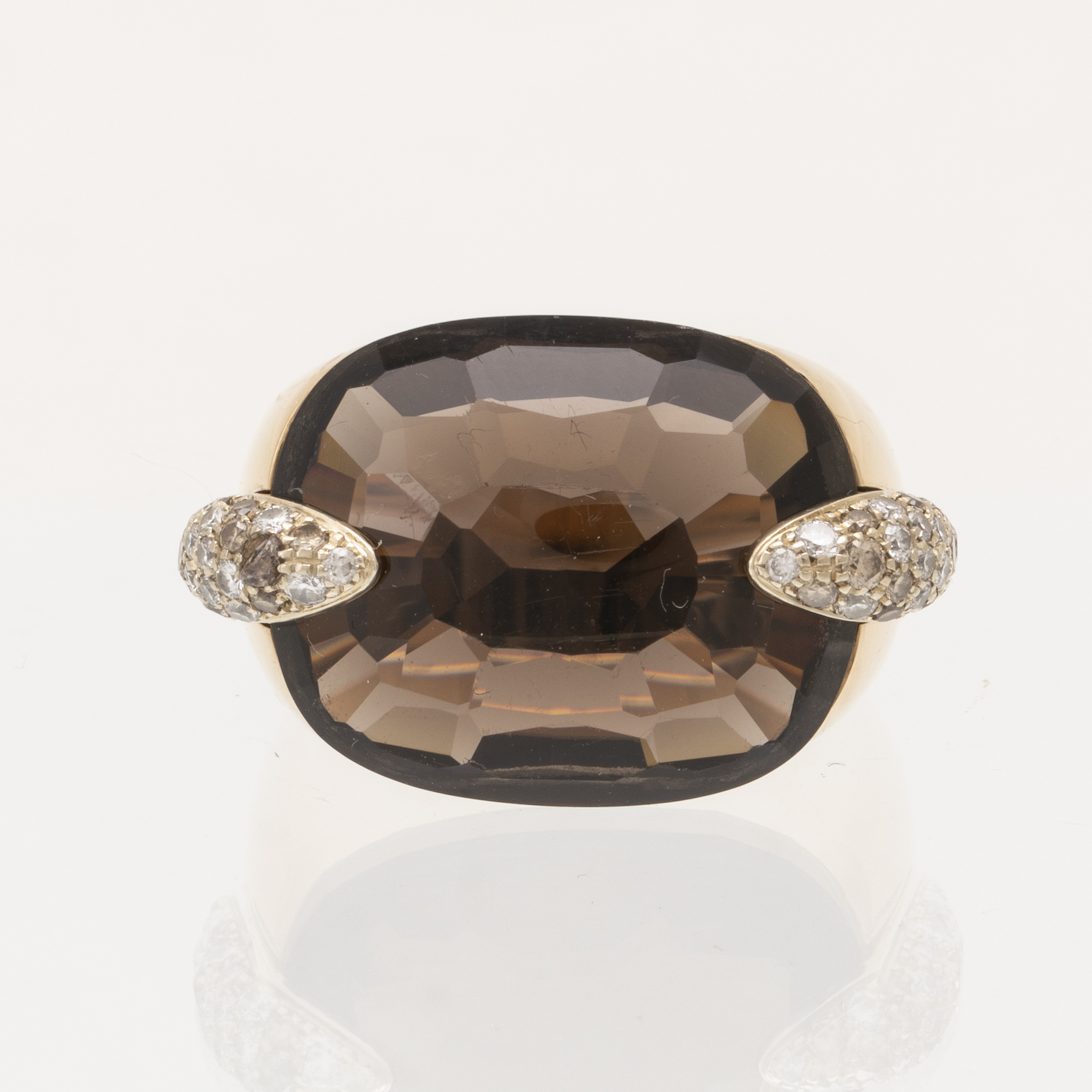 An 18K gold Pomellato "Pin Up" ring set with smoky quartz and round brilliant-cut diamonds ...