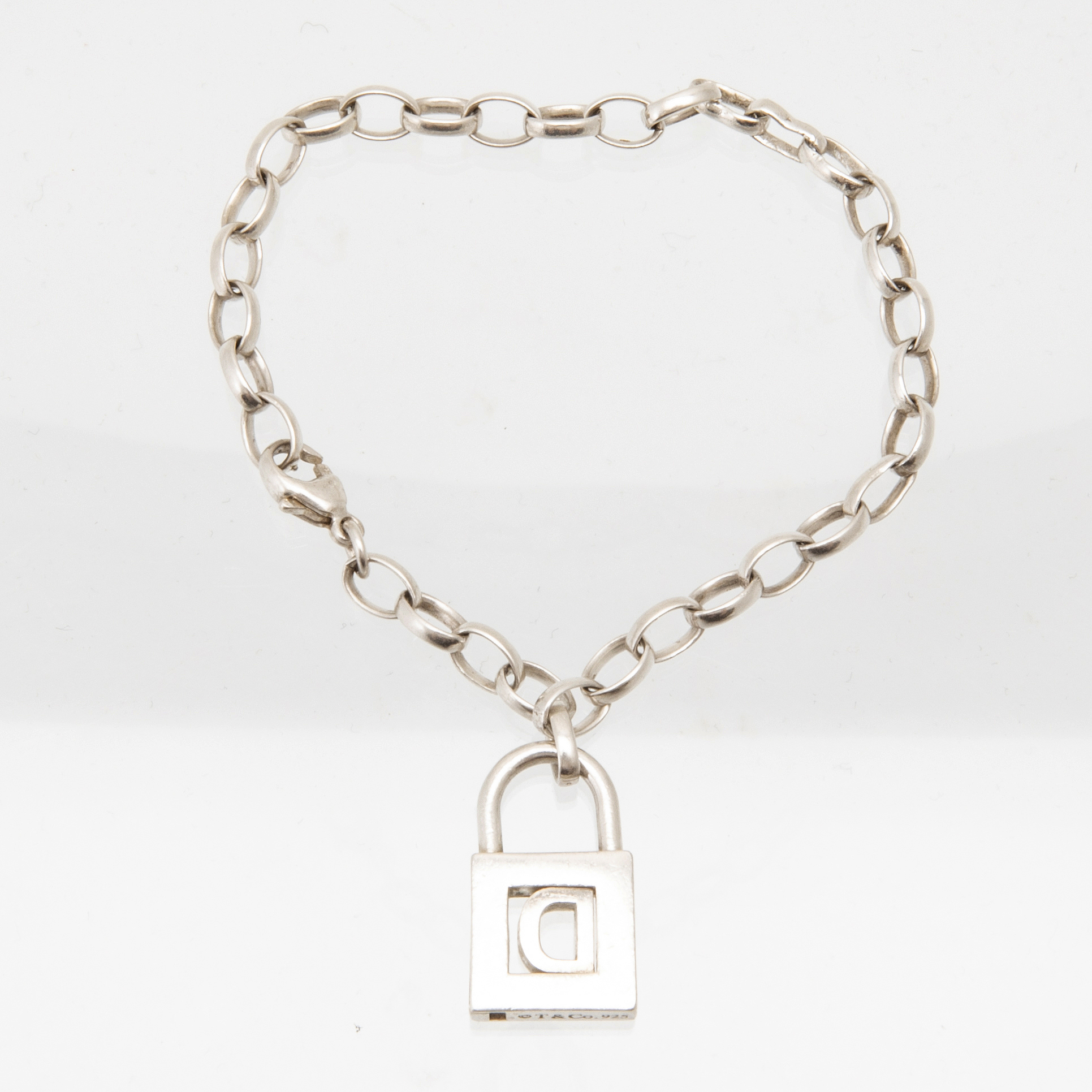 Tiffany & Co berlock silver medföljande armband. - Bukowskis