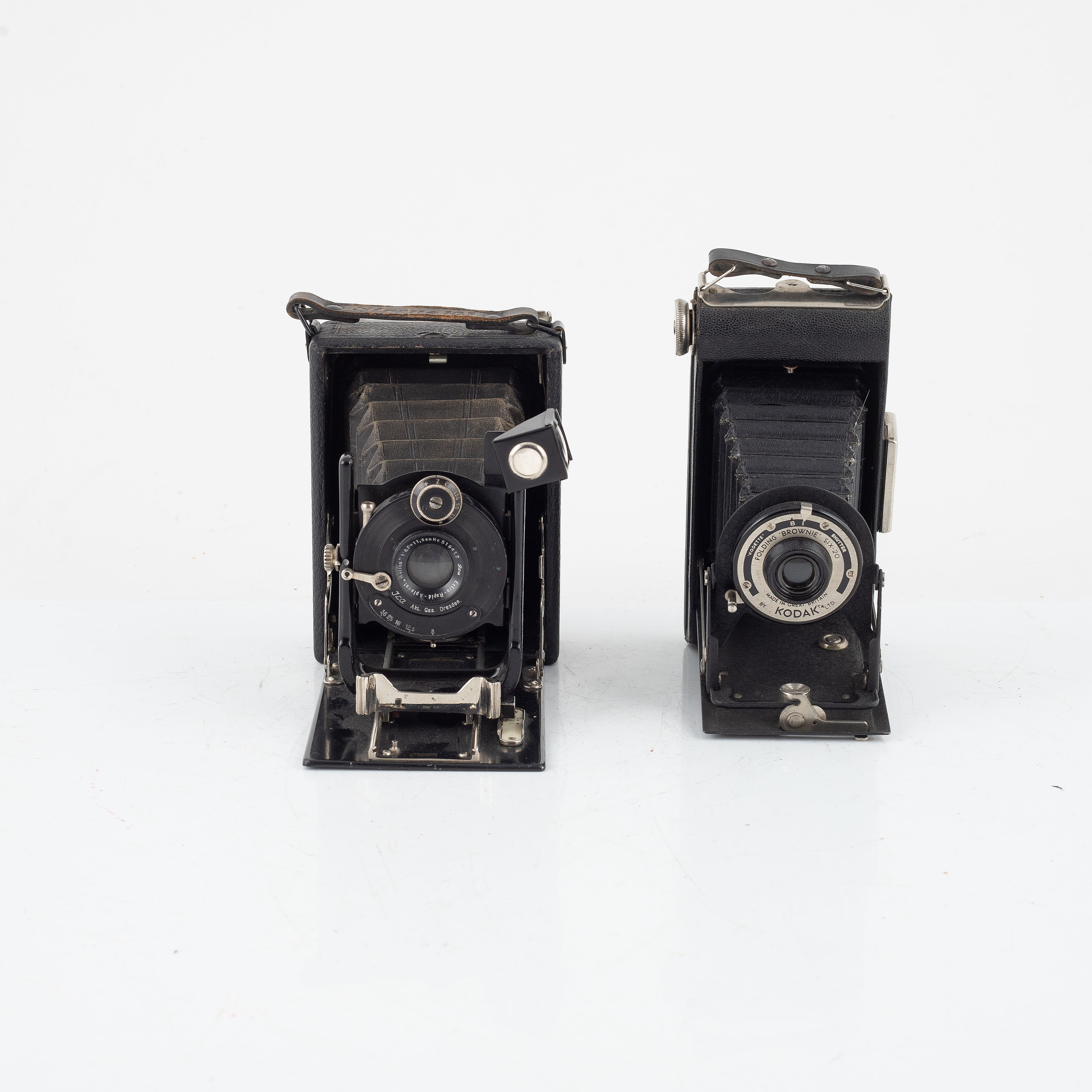 A pair of 1930s cameras, one Kodak Folding Brownie Six-20 and an Ica ...