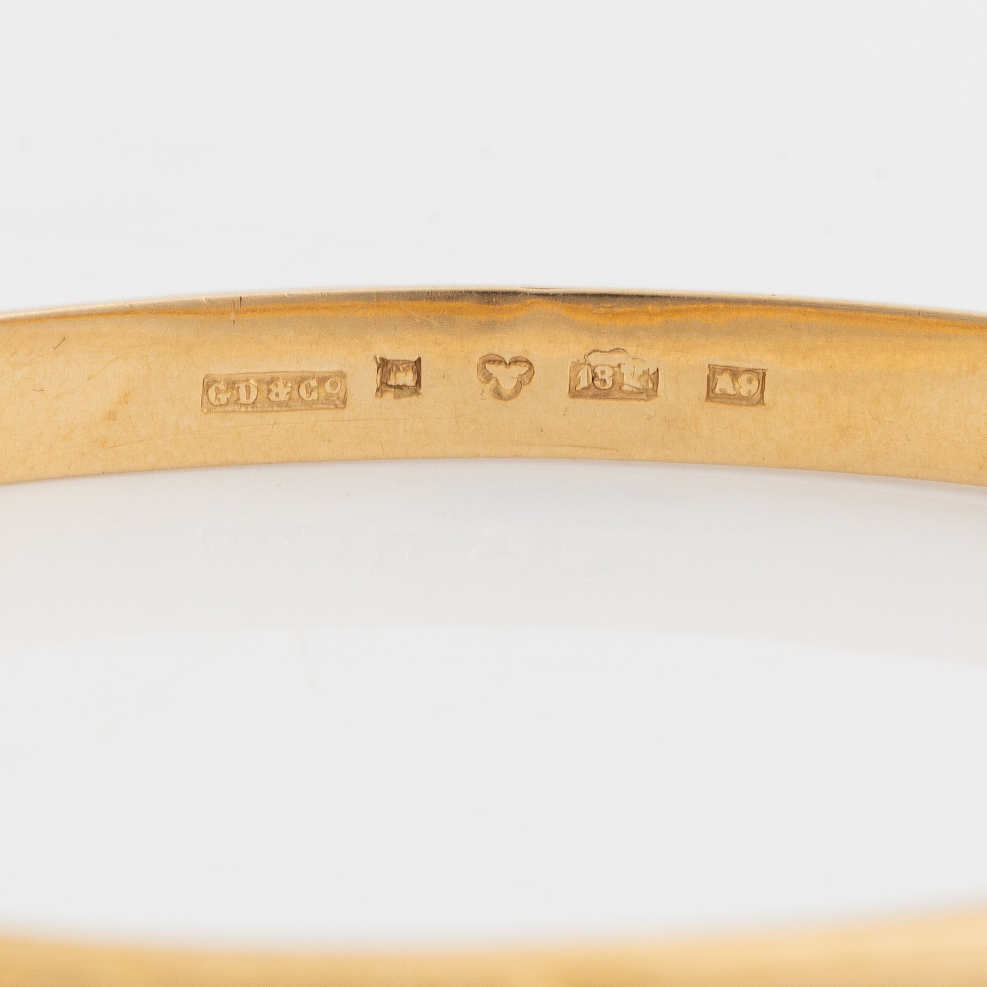 Armring, 18K guld, Gustaf Dahlgren & Co, Malmö 1951. - Bukowskis