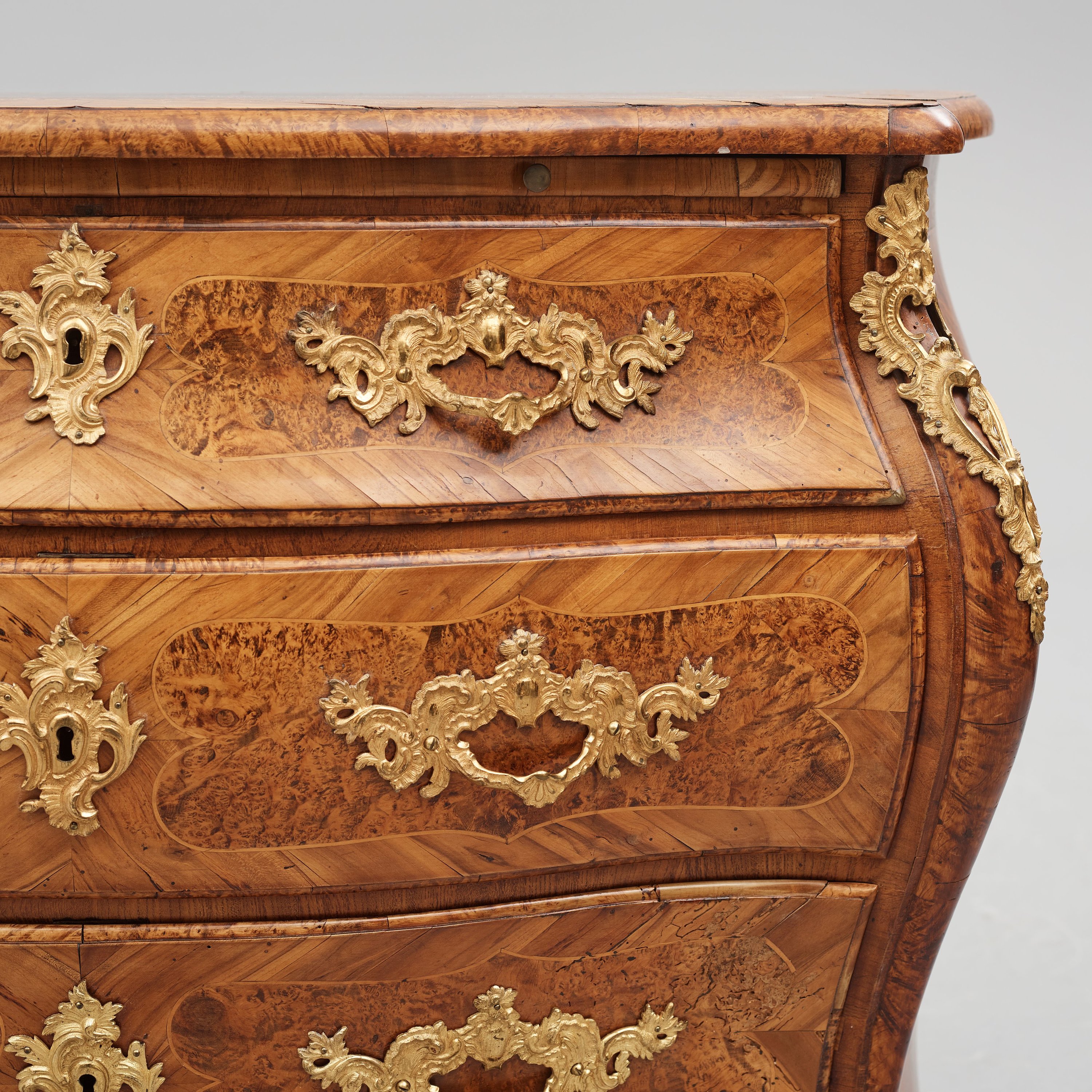 A burr-alder and gilt brass-mounted rococo commode by J. Sjölin (master ...