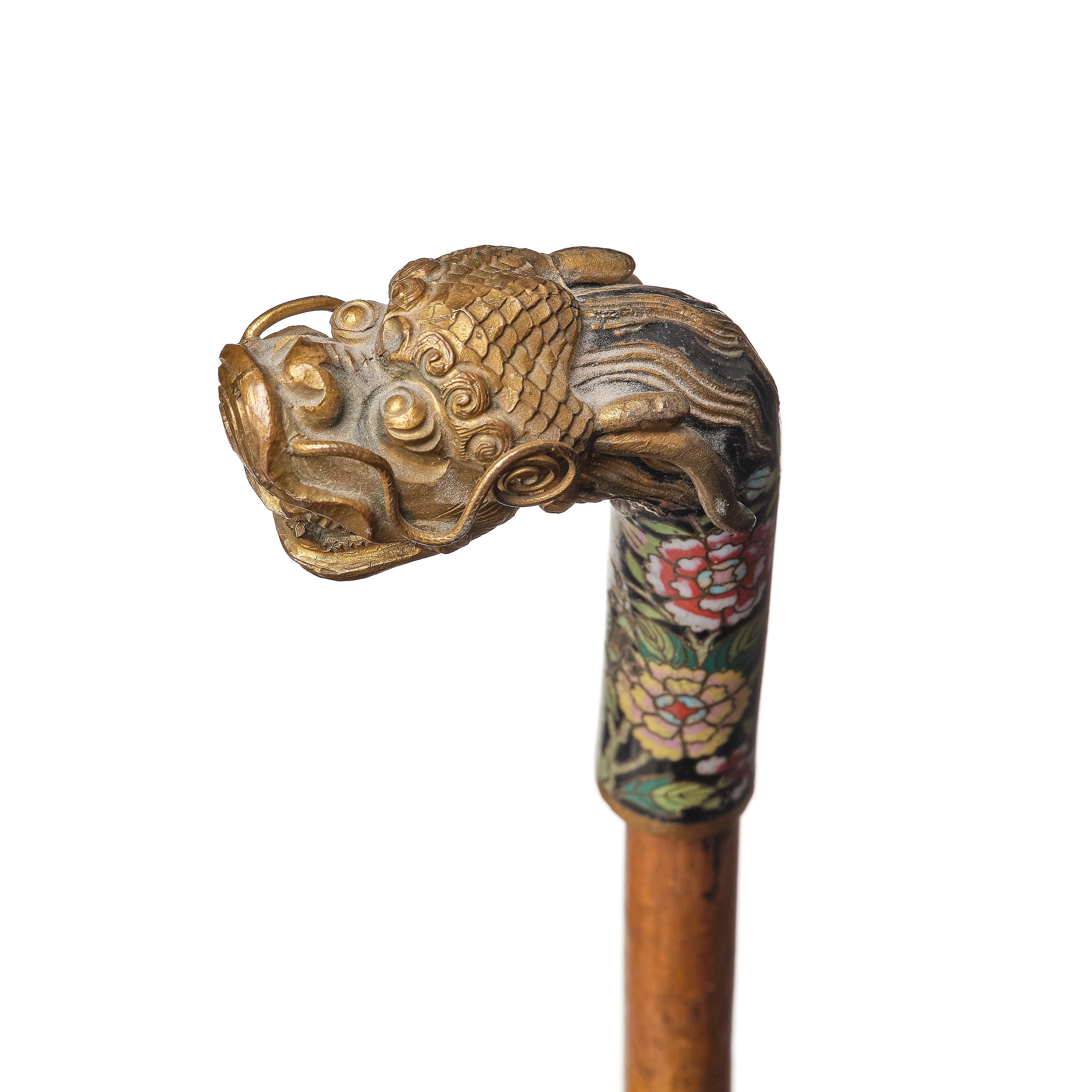 A Chinese bamboo walking cane with a cloisonné handle, late Qing ...