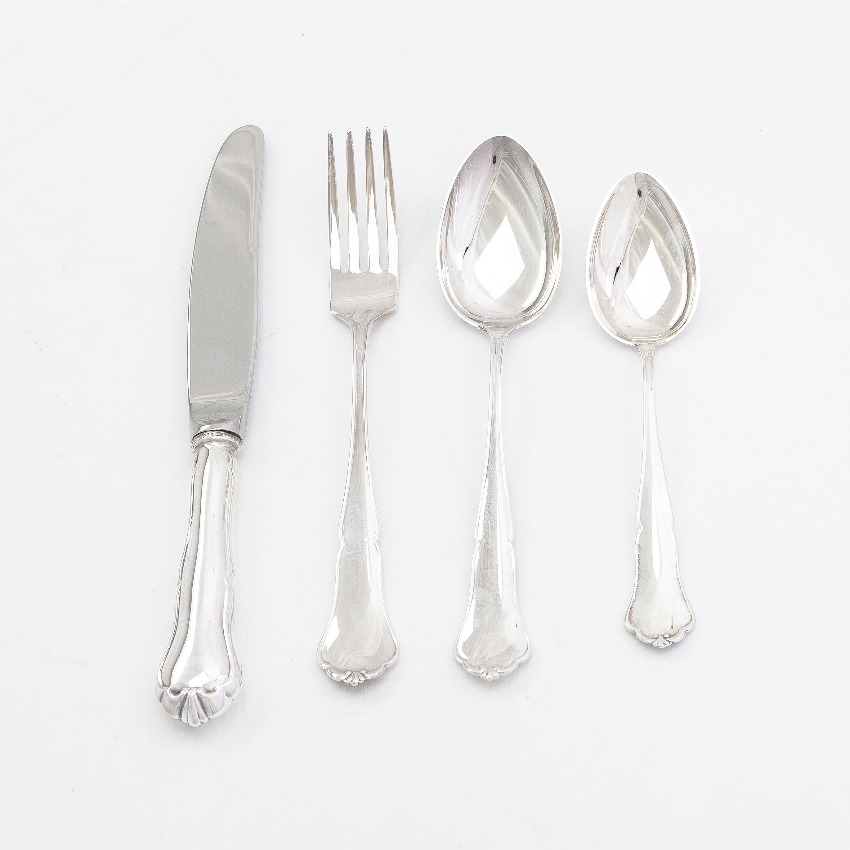 A 35-piece 'Chippendale' silver cutlery set, Auran Kultaseppä oy, Turku ...