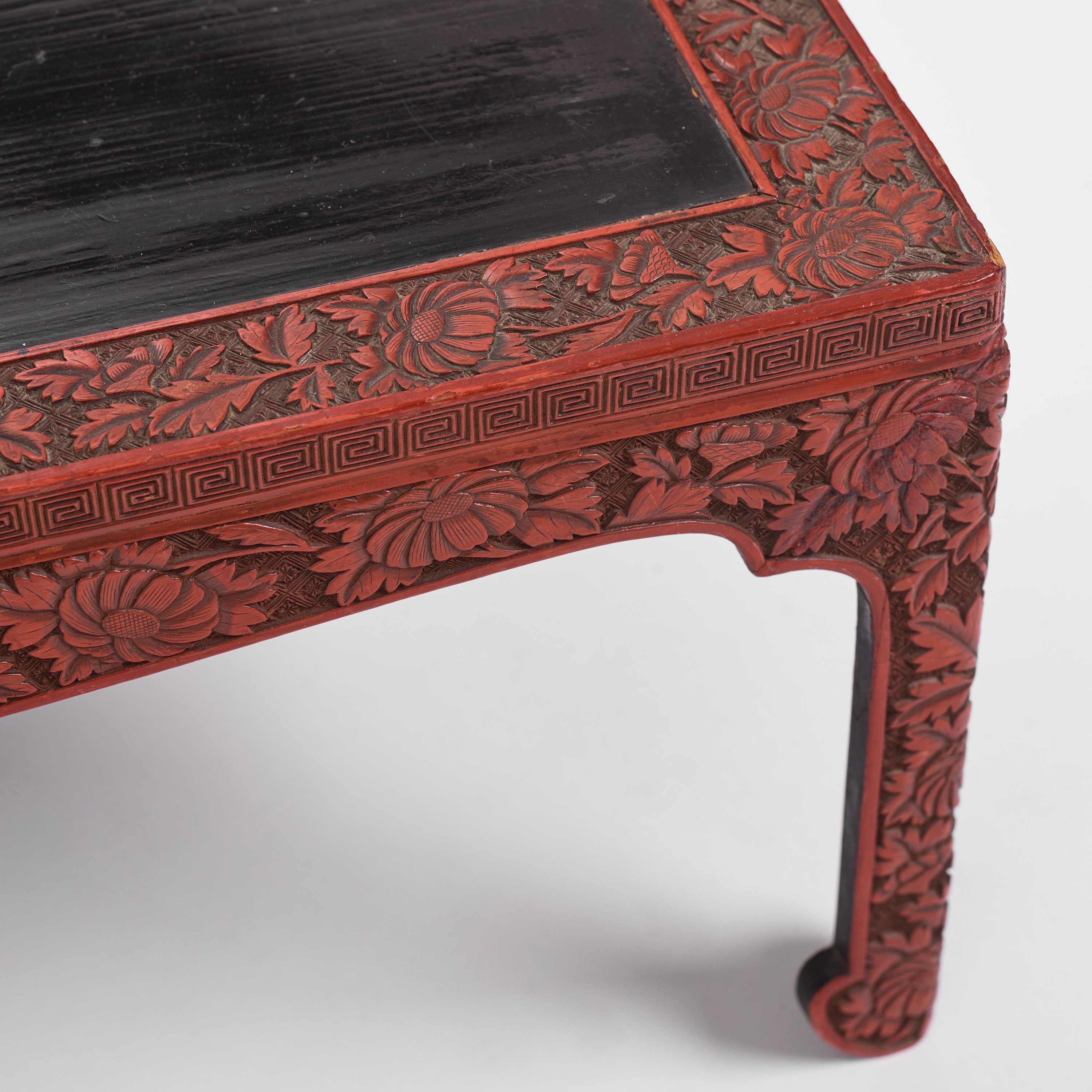 A carved lacquered table, early 20th Century. - Bukowskis