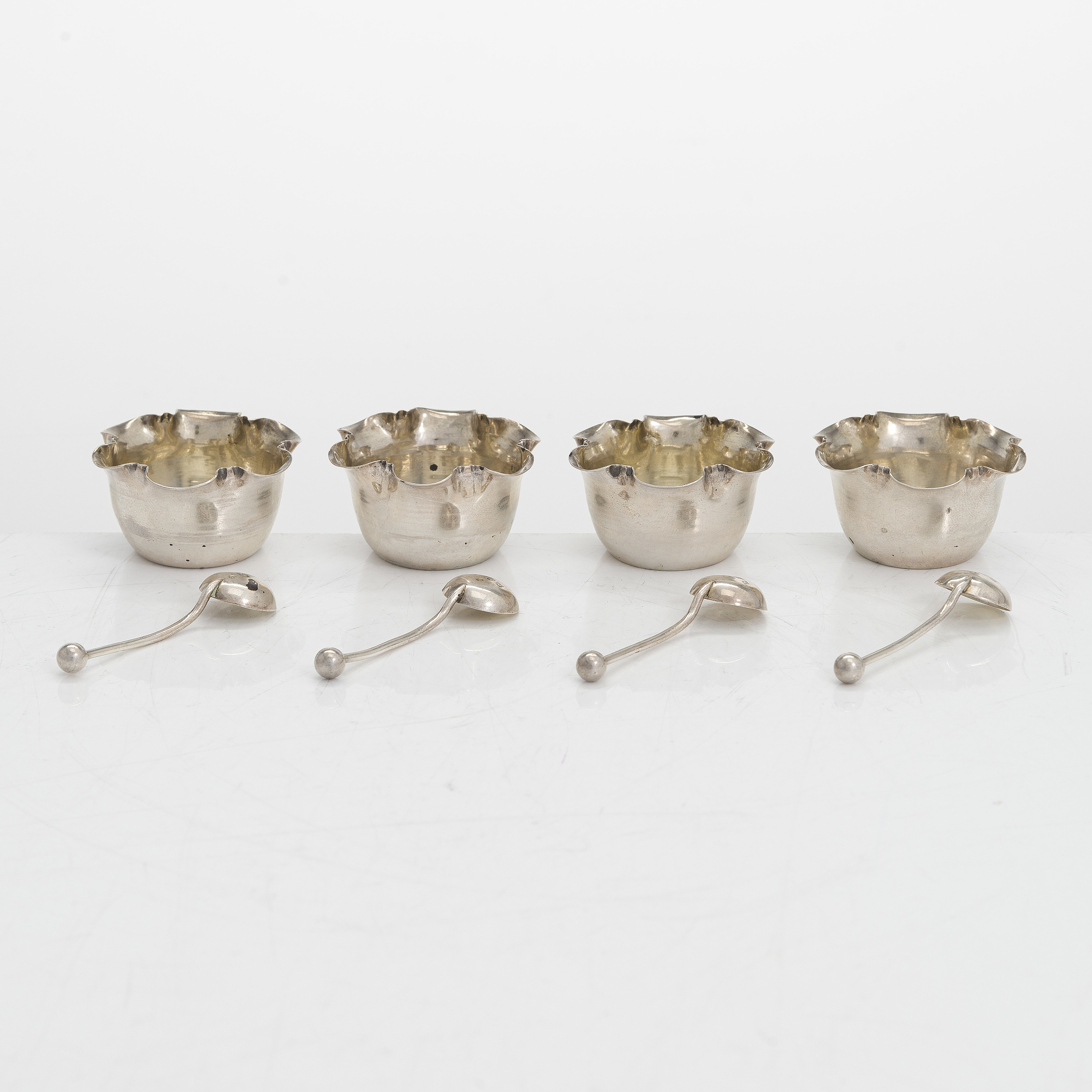 Nathan & Hayes, a sterling silver salt cellar set for four, Birmingham ...