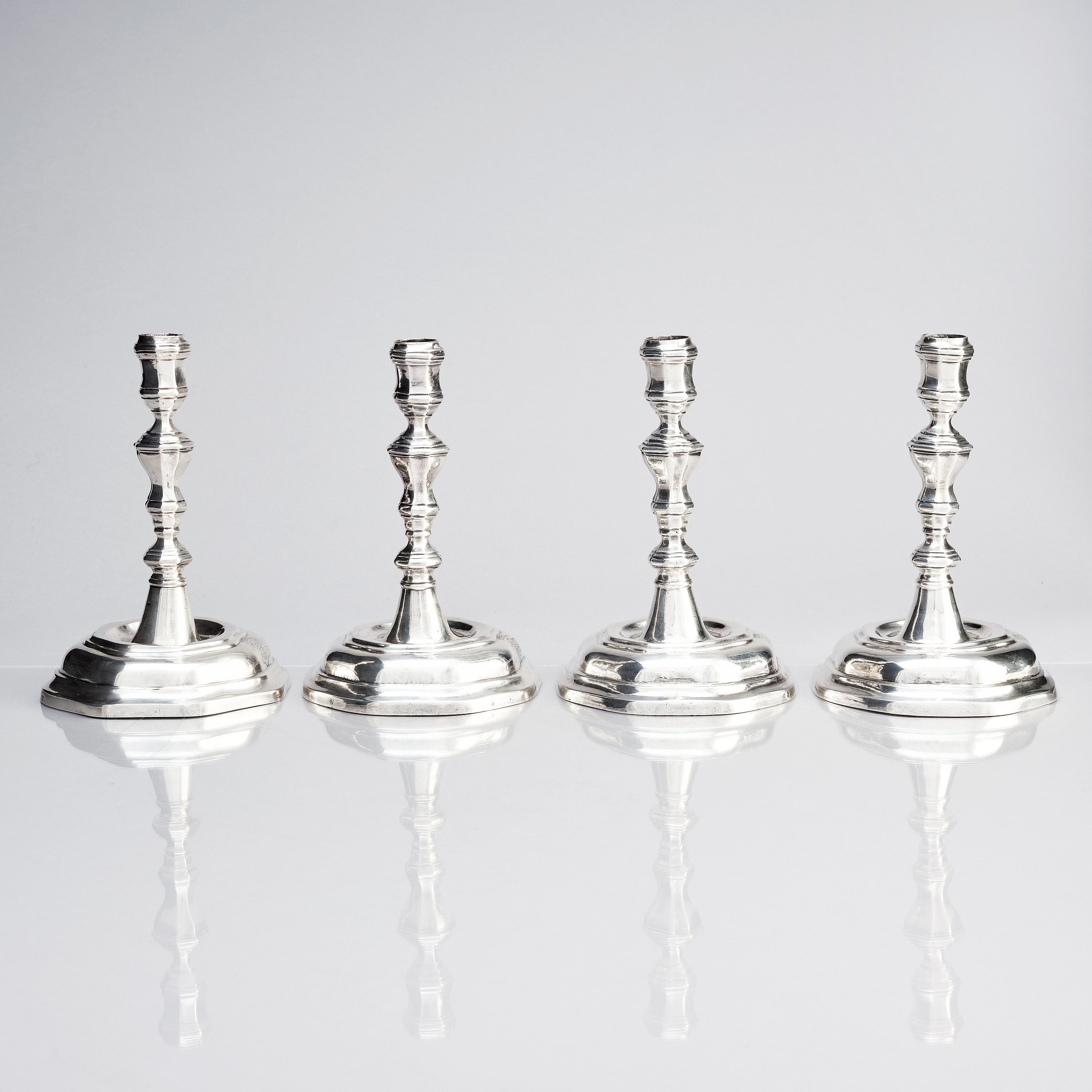 Four German early 18th century silver candlesticks, Stuttgart. - Bukowskis