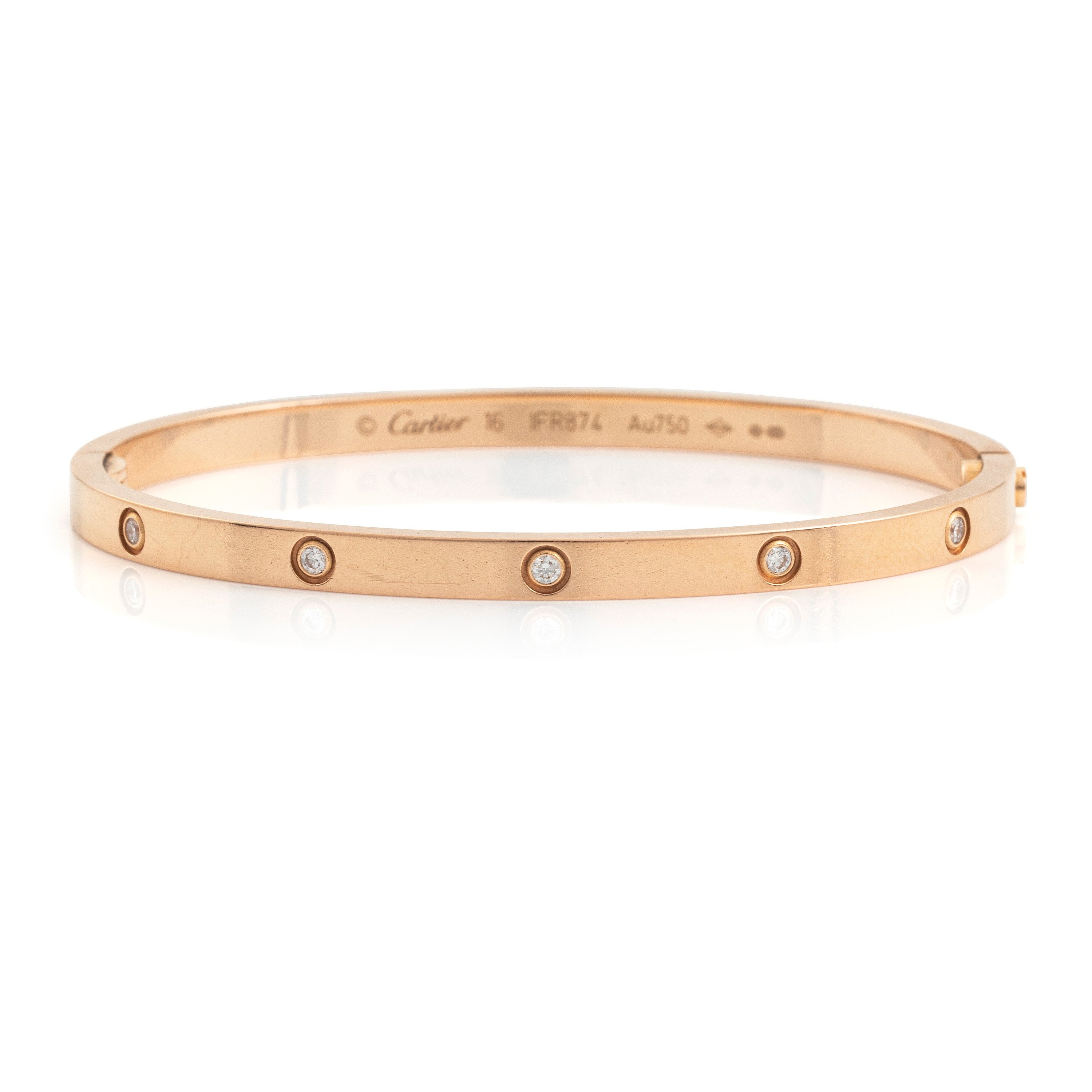 A Cartier "Love" bracelet small model in 18K rose gold with ten round ...