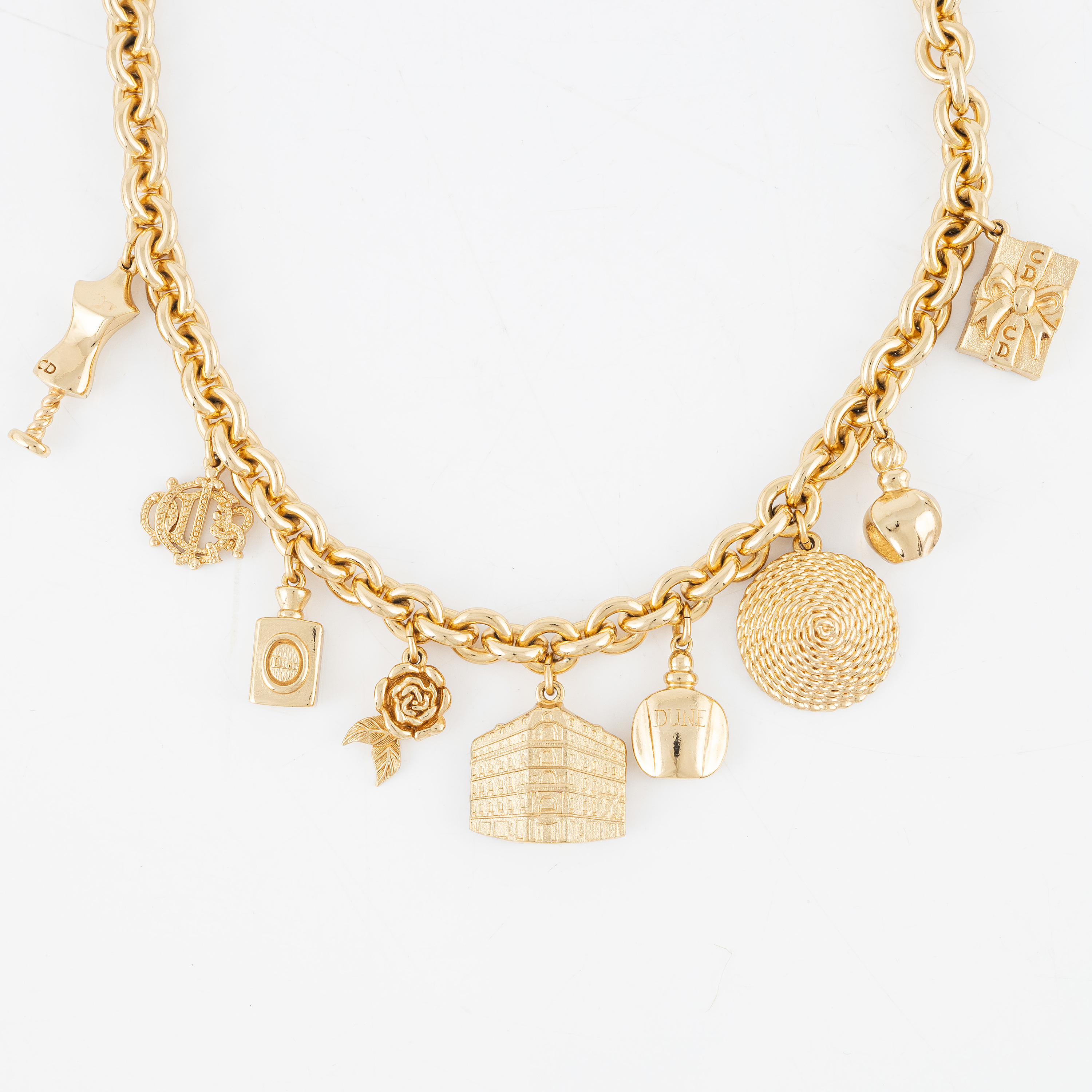 Christian Dior, collier och pin. - Bukowskis