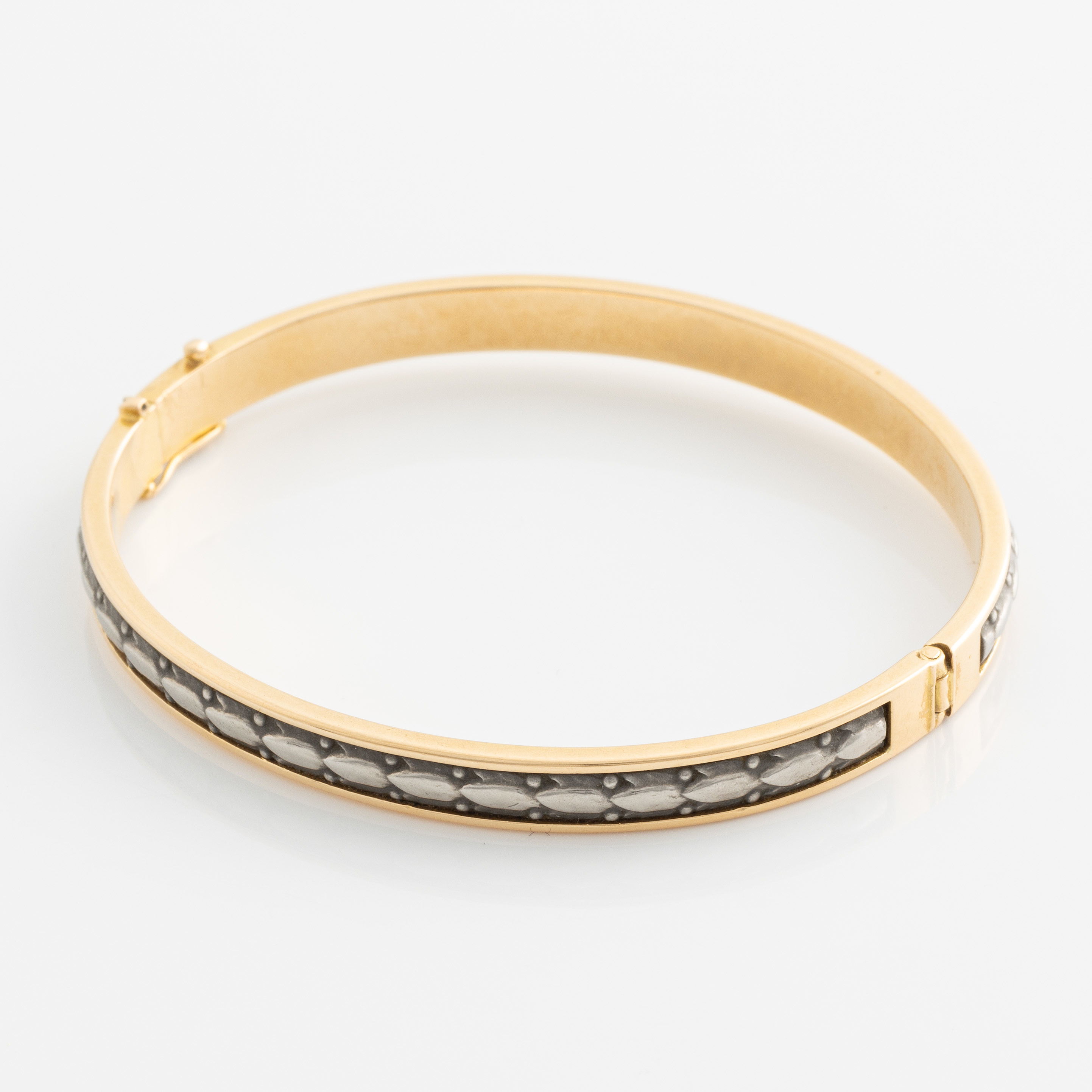 Bangle 18K gold and white metal. - Bukowskis