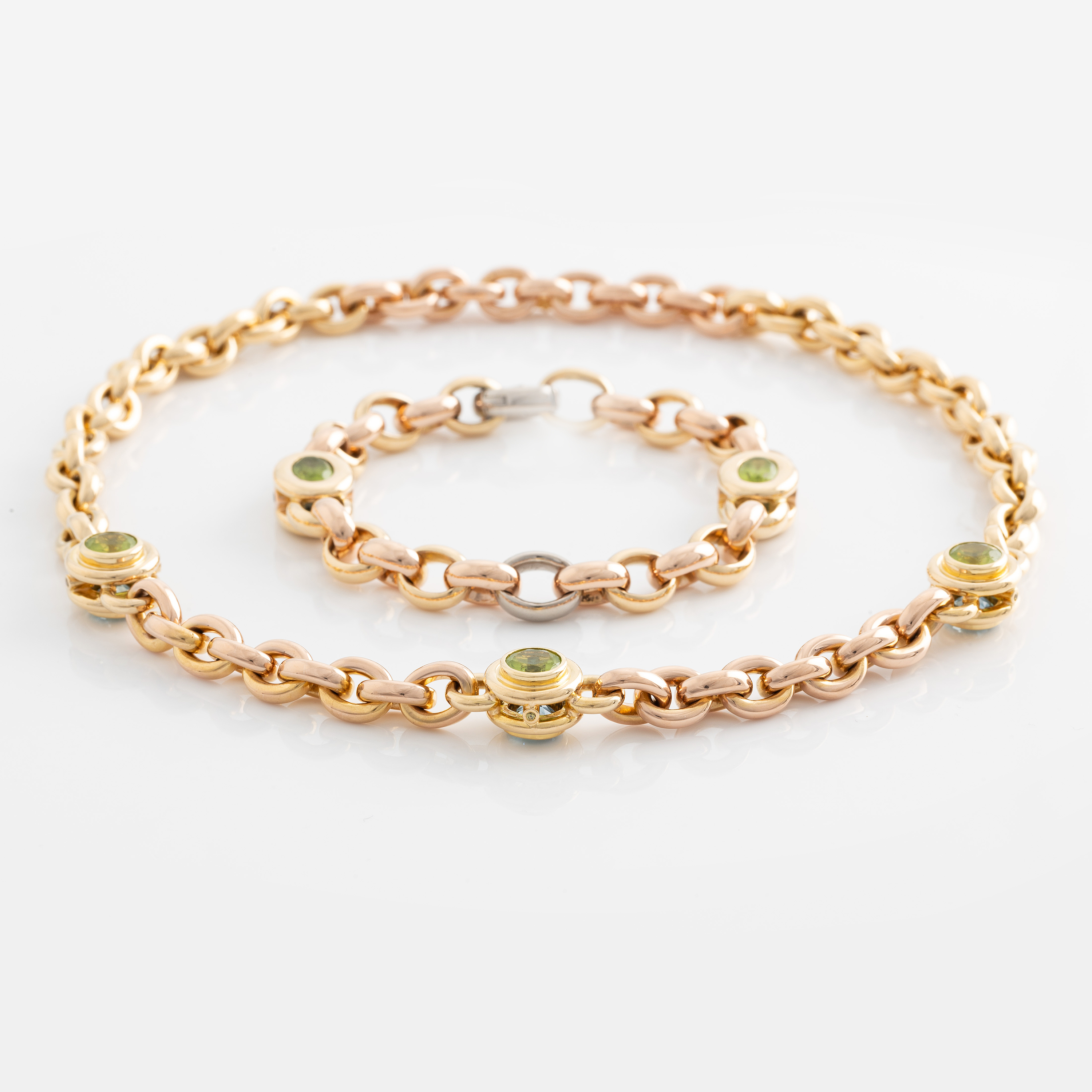 Gaudy, necklace and bracelet with peridot and aquamarines. - Bukowskis