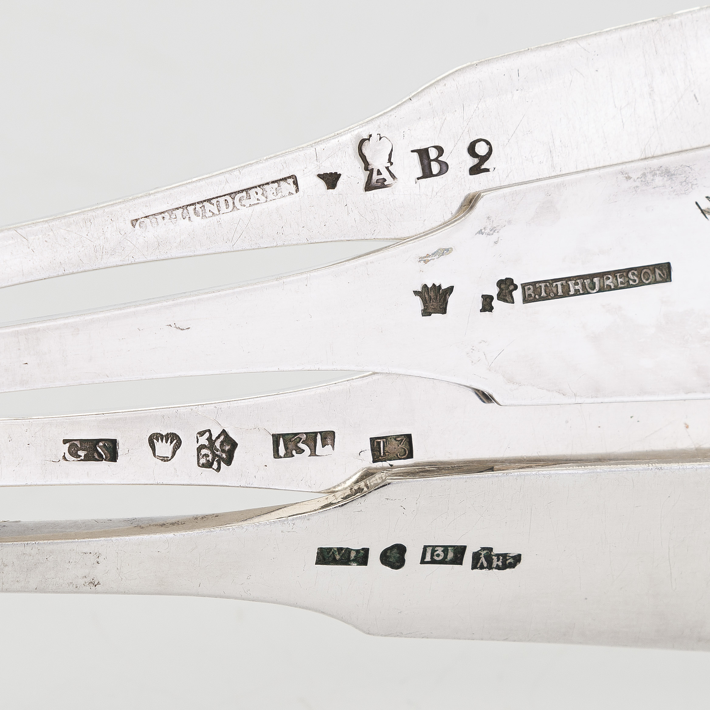 Eighteen 19th-Century silver shell motif spoons, and sprinkle spoon ...