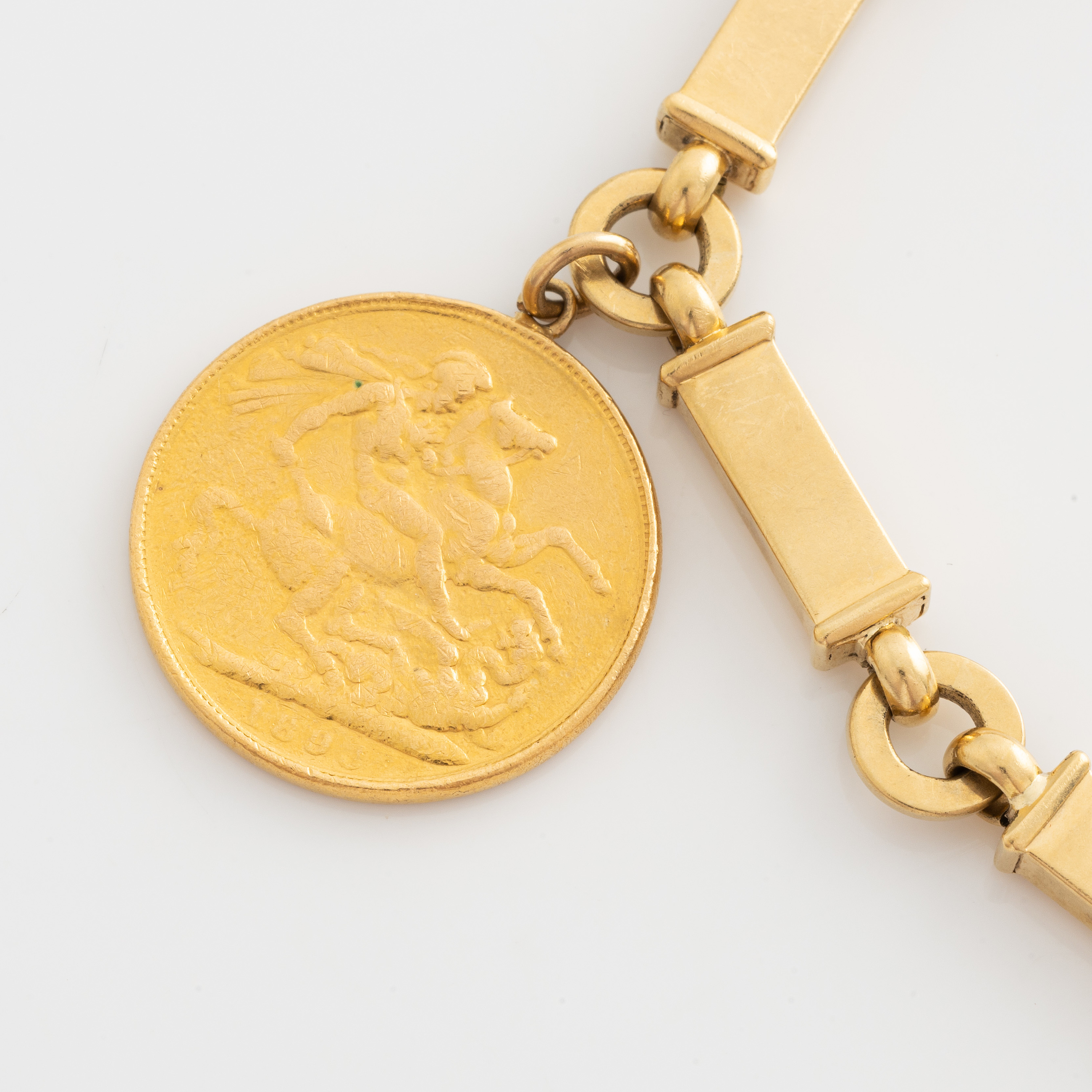 Bracelet 18K gold, Italy, with gold coin, sovereign. - Bukowskis