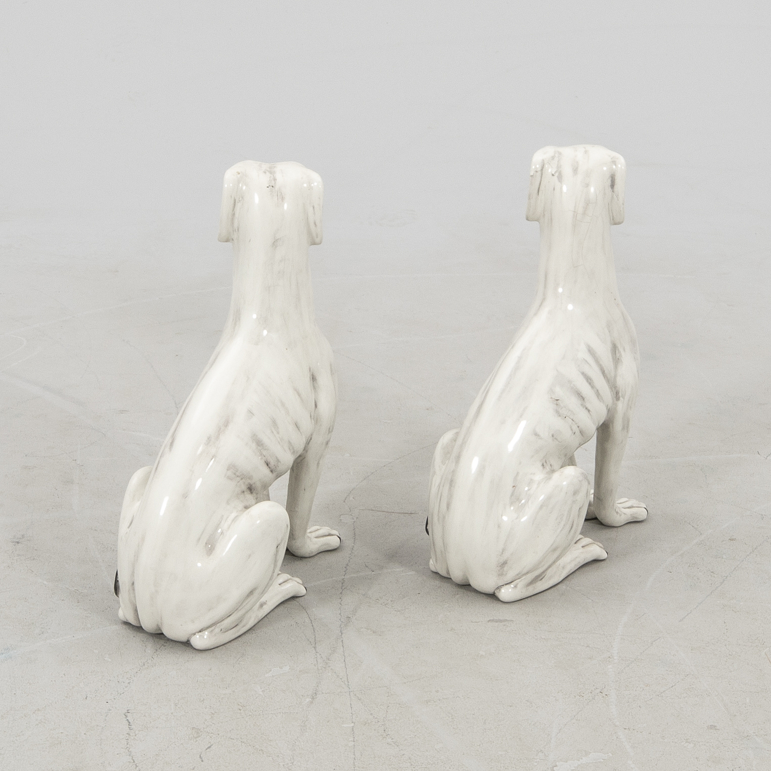 A pair of figurines Italy 20th century. - Bukowskis