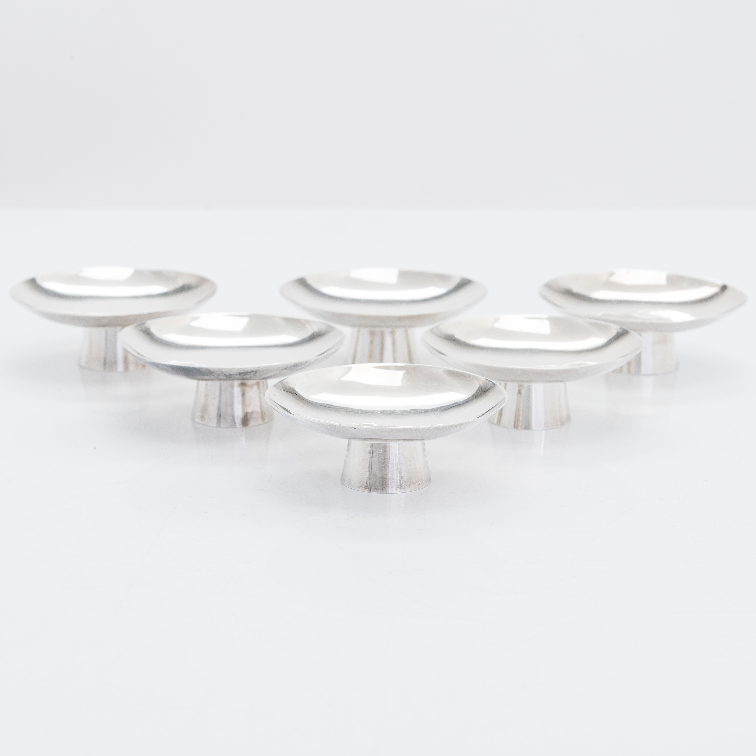 A 6-piece set of silver sakazuki sake cups, Suzuyo, Japan, marked with ...